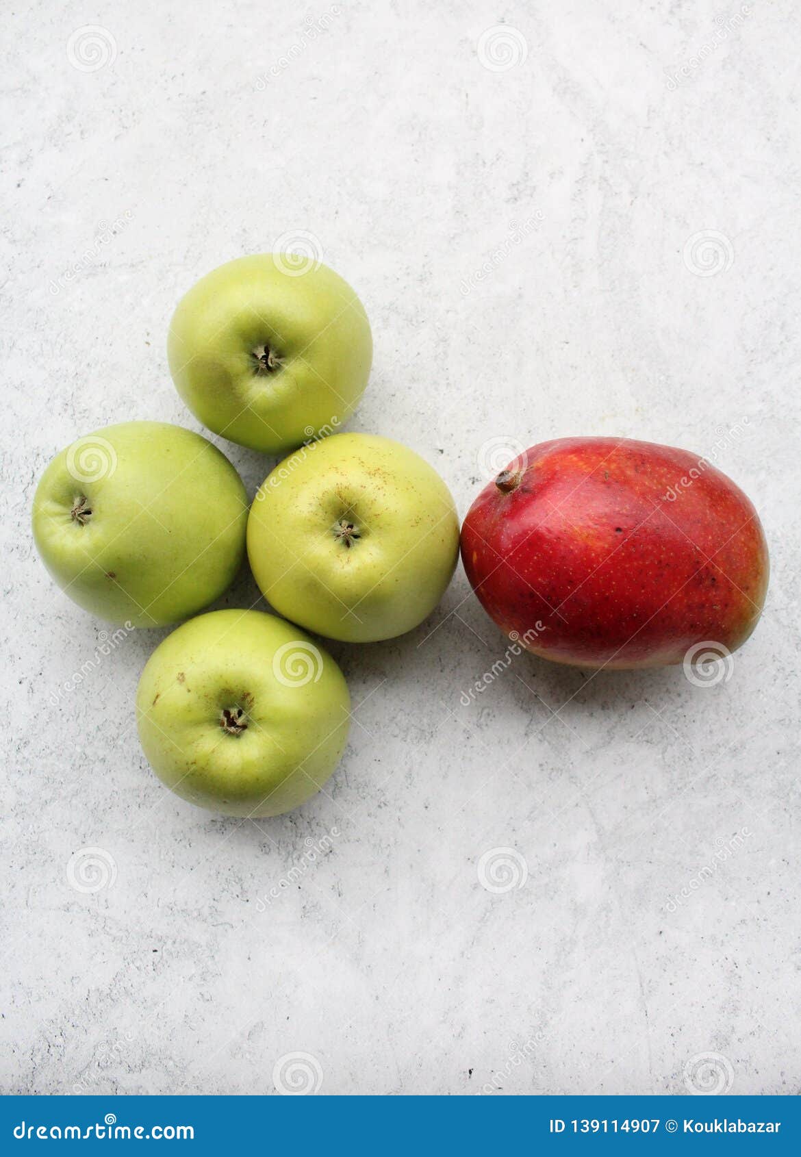 One mango and green apples stock image. Image of vitamin - 139114907