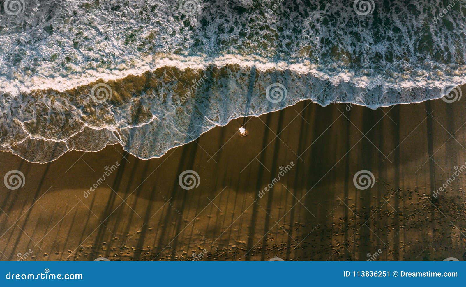 One Men Stay on the Beach. Wave and Shadow Reflection from Palms. Dark ...