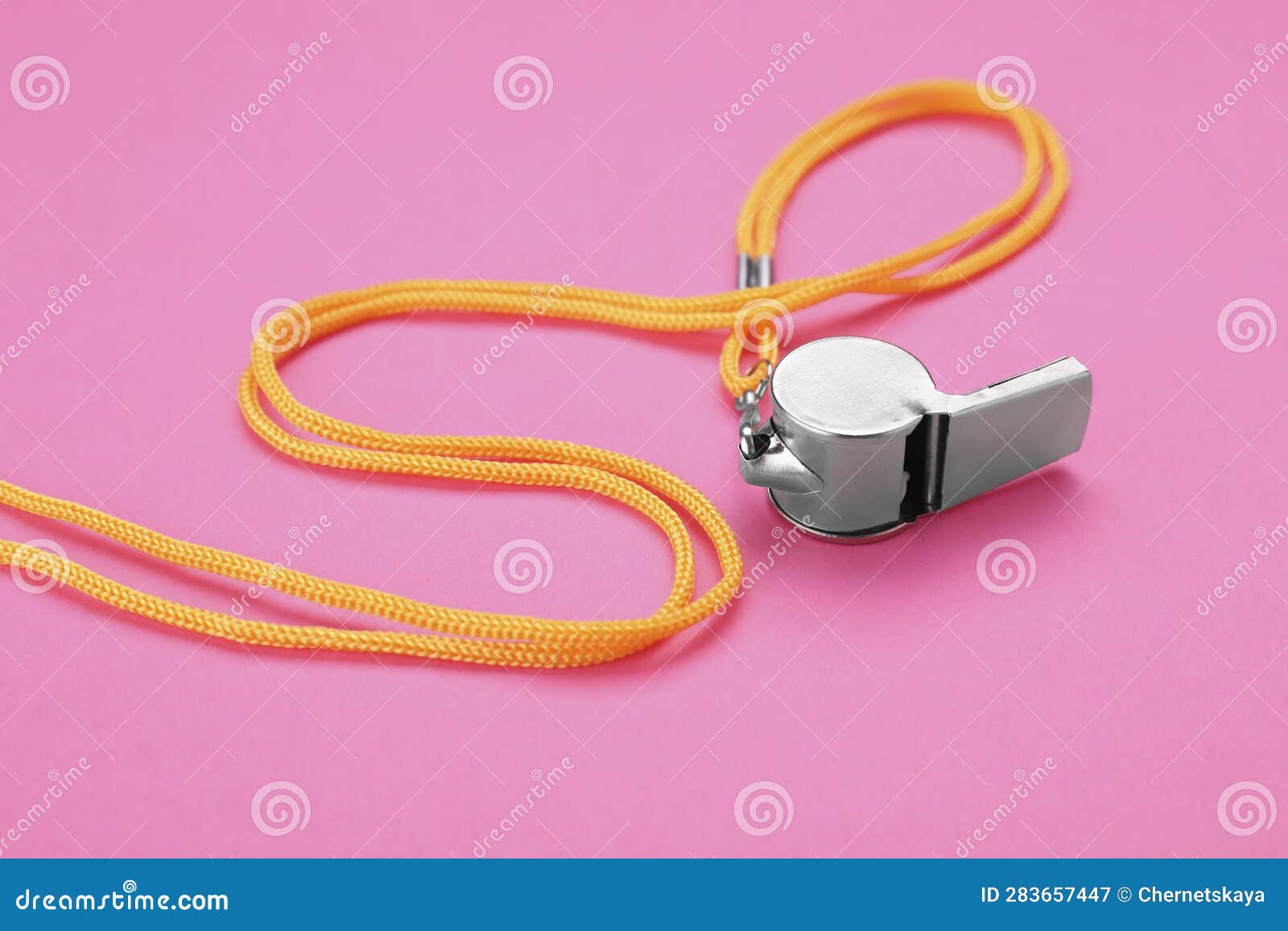 One Metal Whistle with Cord on Pink Background Stock Image - Image of ...