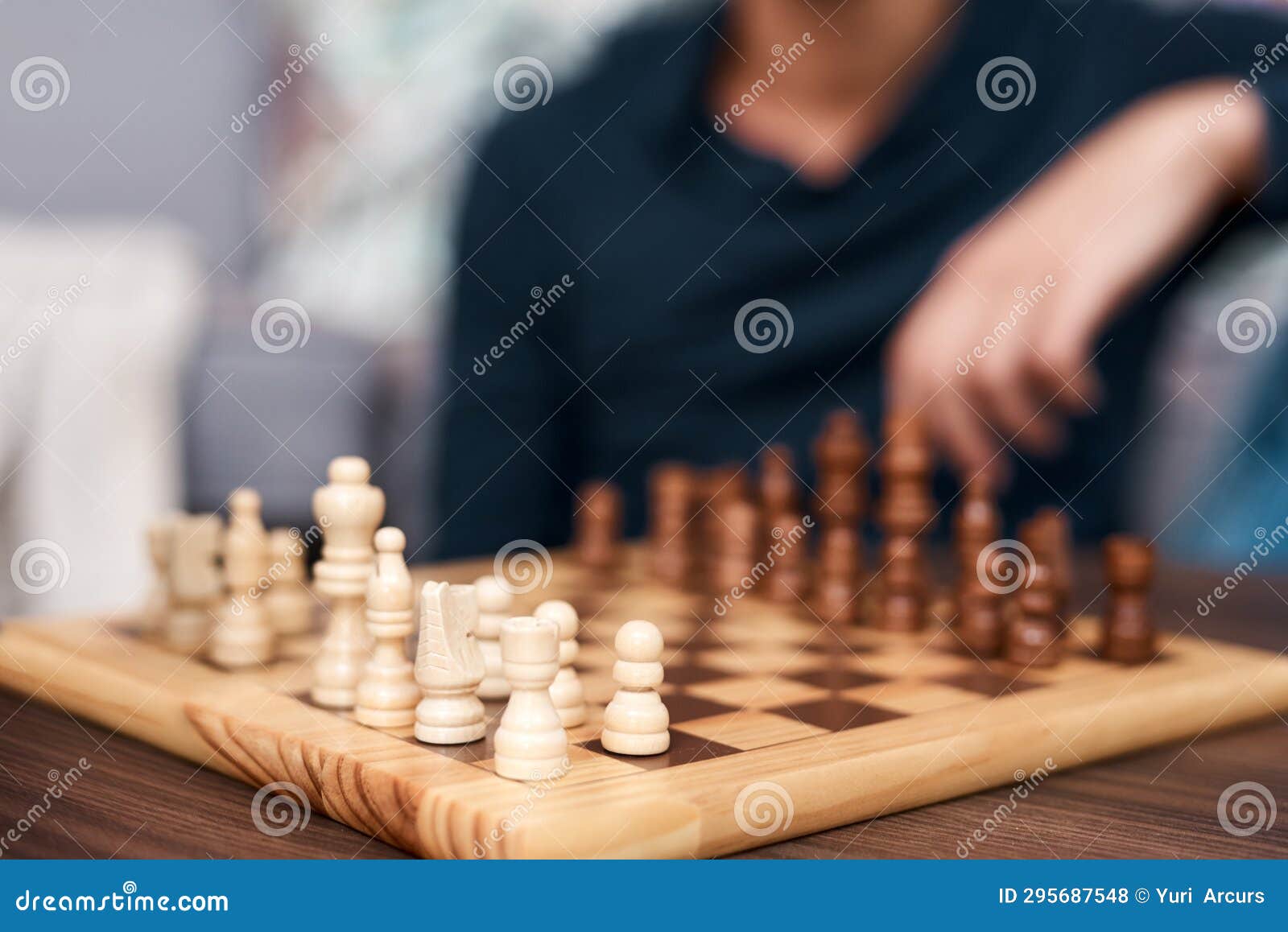 One Move Makes All the Difference. an Unrecognisable Man Playing a Game ...