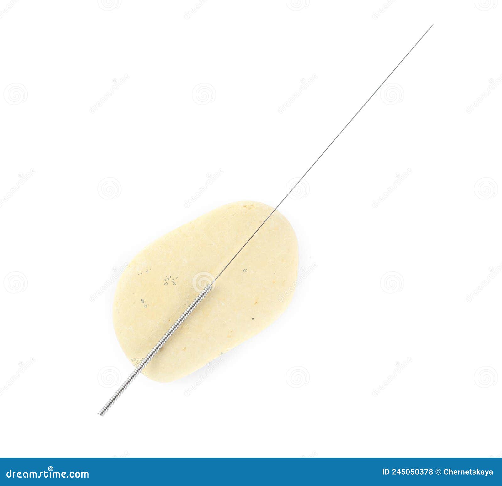 One Needle for Acupuncture and Stone on White Background, Top View ...