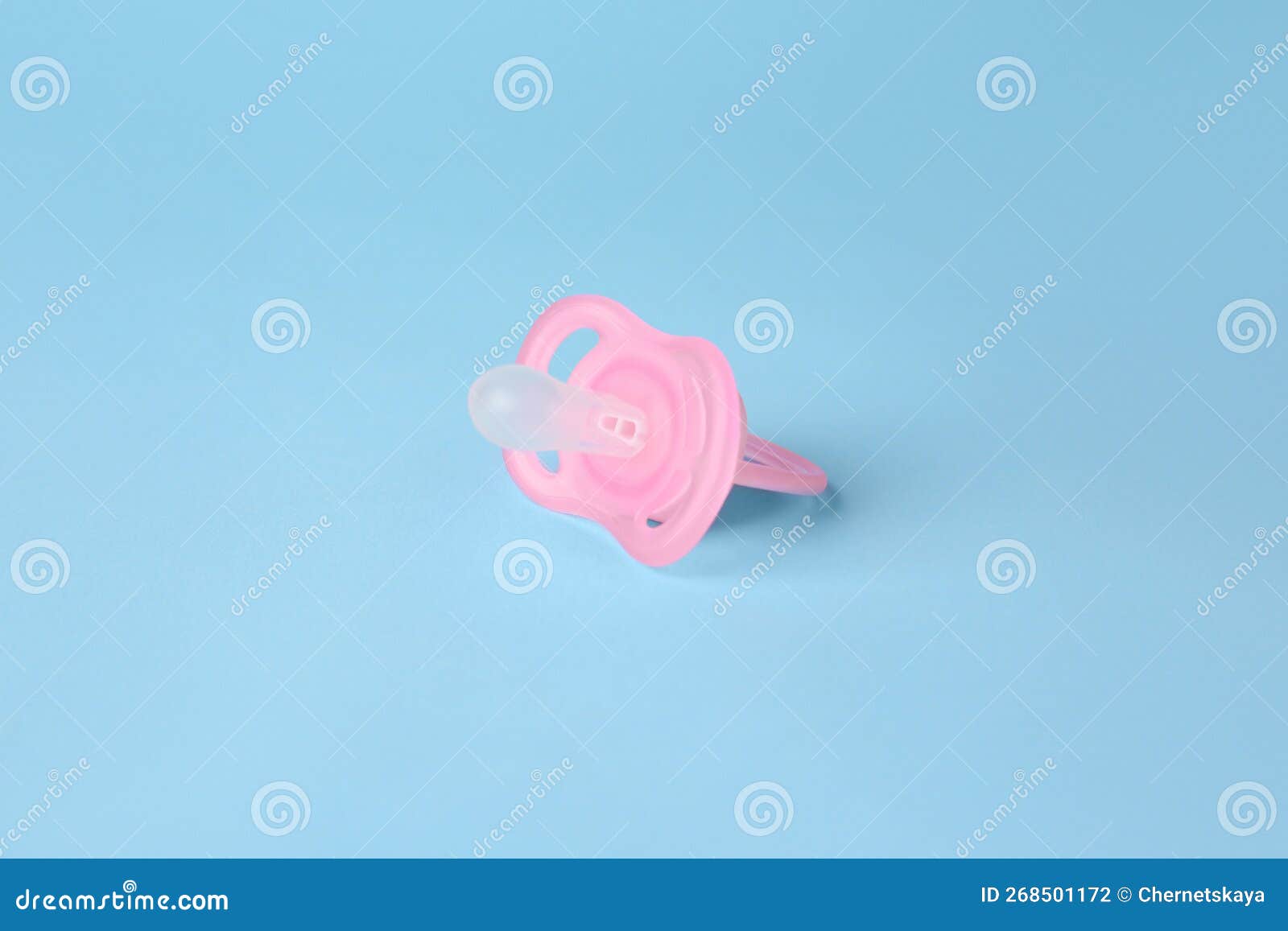 One New Baby Pacifier on Light Blue Background Stock Photo - Image of ...