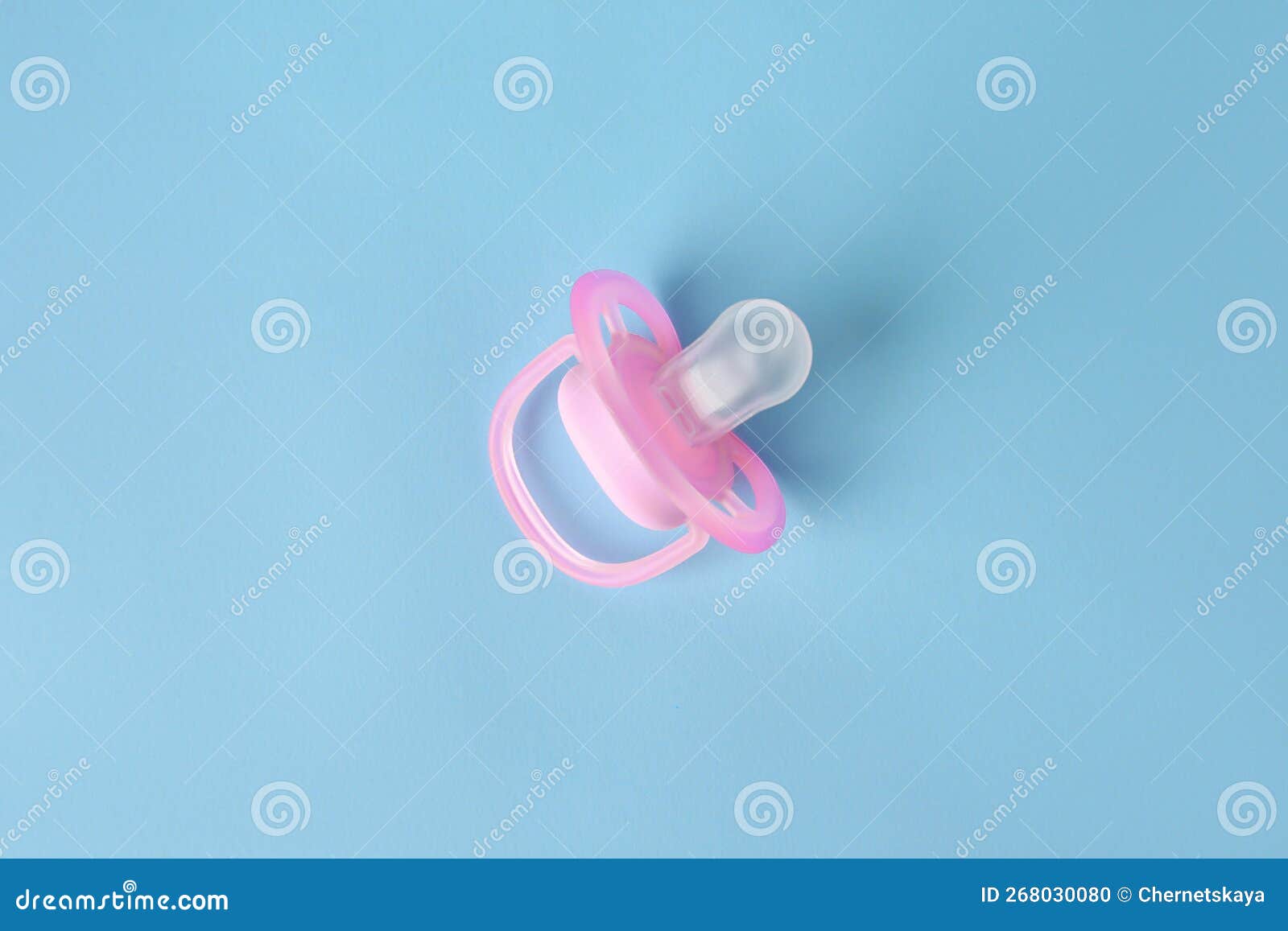 One New Baby Pacifier on Light Blue Background, Top View Stock Photo ...