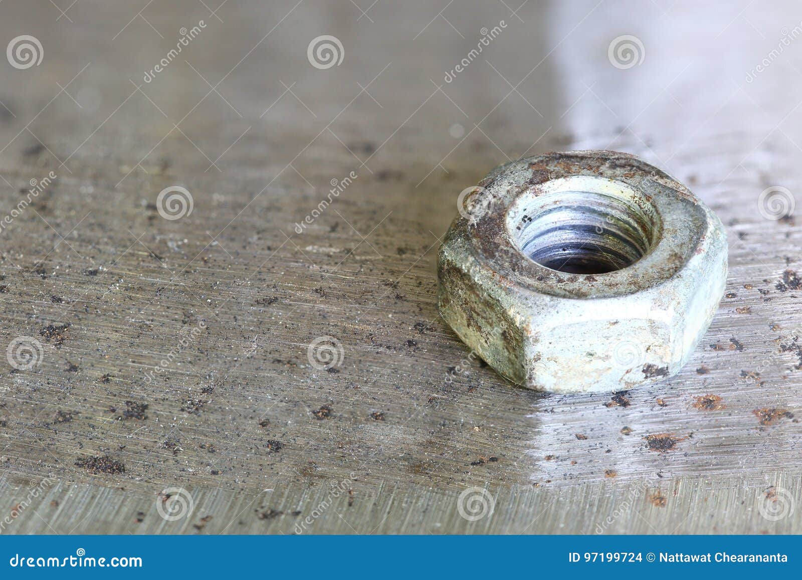 One Nut Bolt on Scratch Metal Floor with Stain Stock Photo - Image of ...