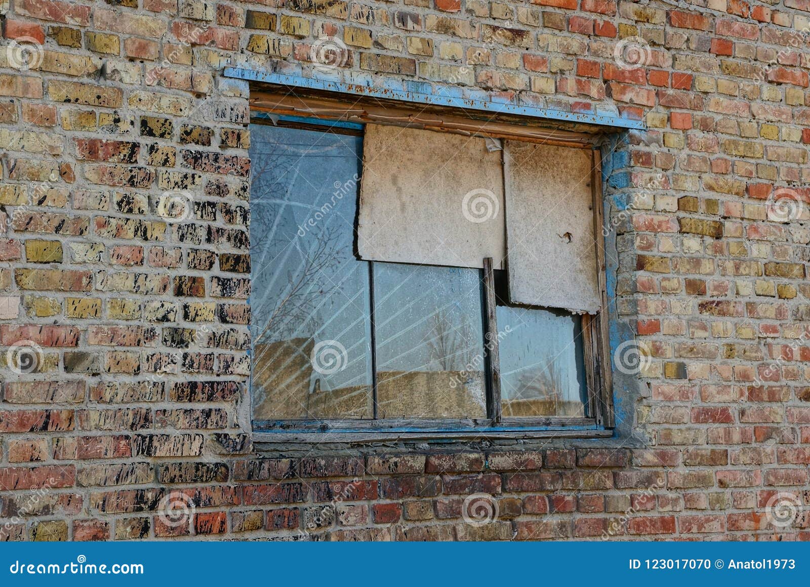 Old Broken Window with a Lattice on a Brick Brown Wall Stock Photo ...