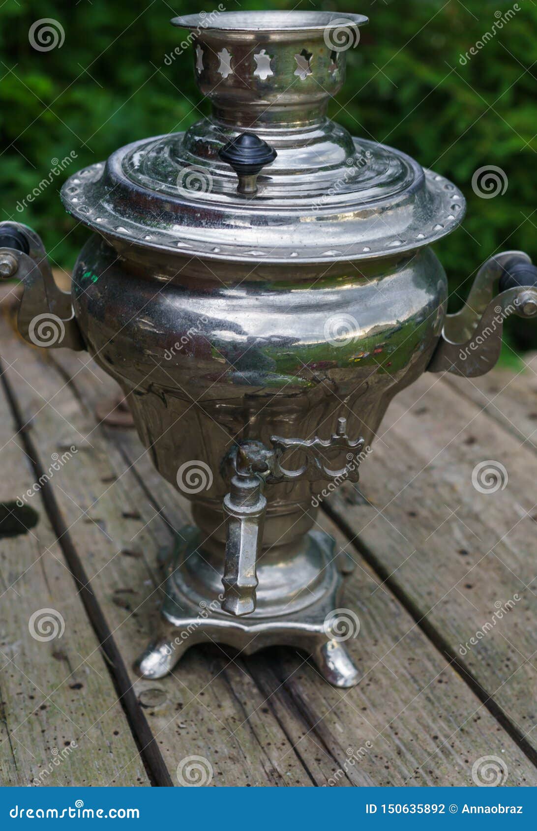 One Old Metal Samovar for Making Tea on a Wooden Table Stock Photo ...