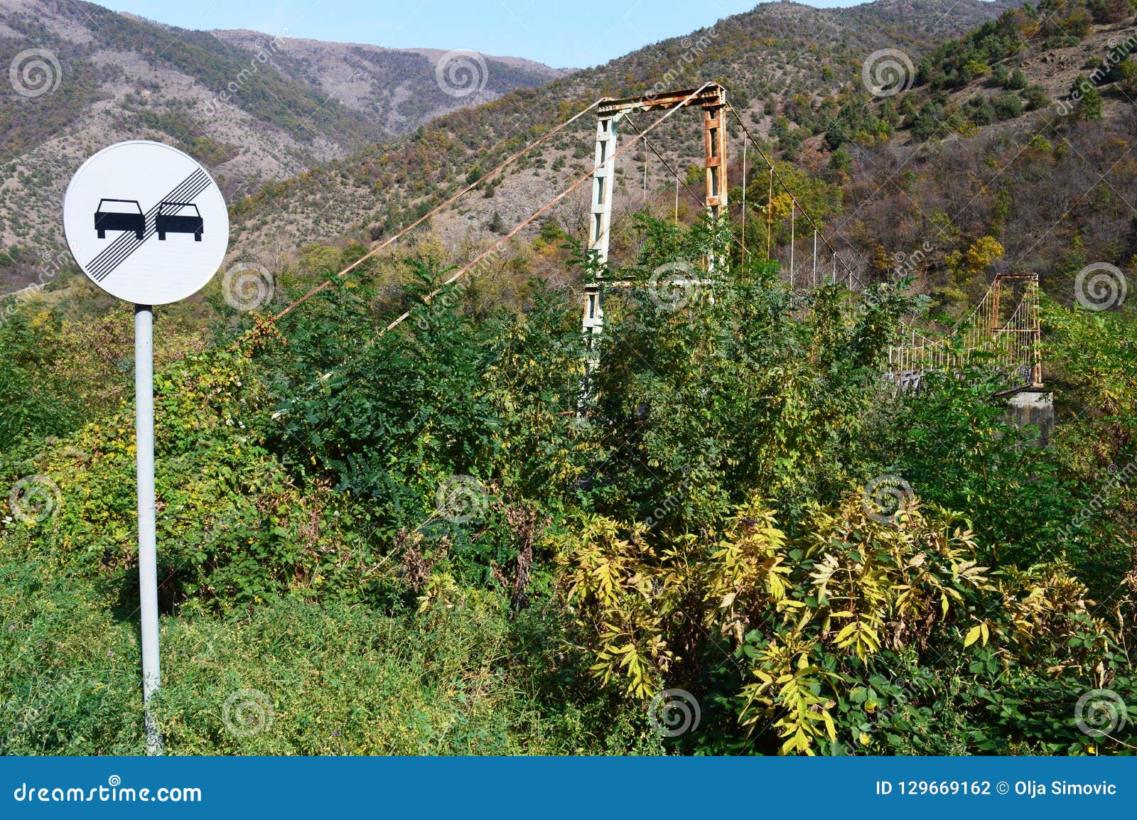 Old ruined wire bridge stock photo. Image of sign, hill - 129669162