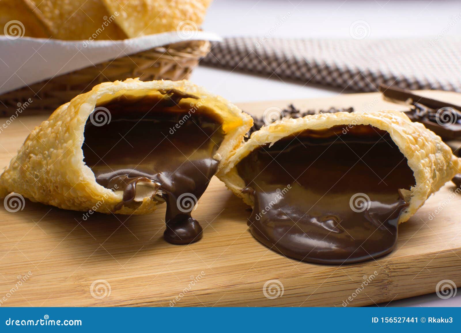 One Open Tradional Brazilian Fried Pastry Called Pastel Stuffed With Chocolate Brazilian Dessert 6670