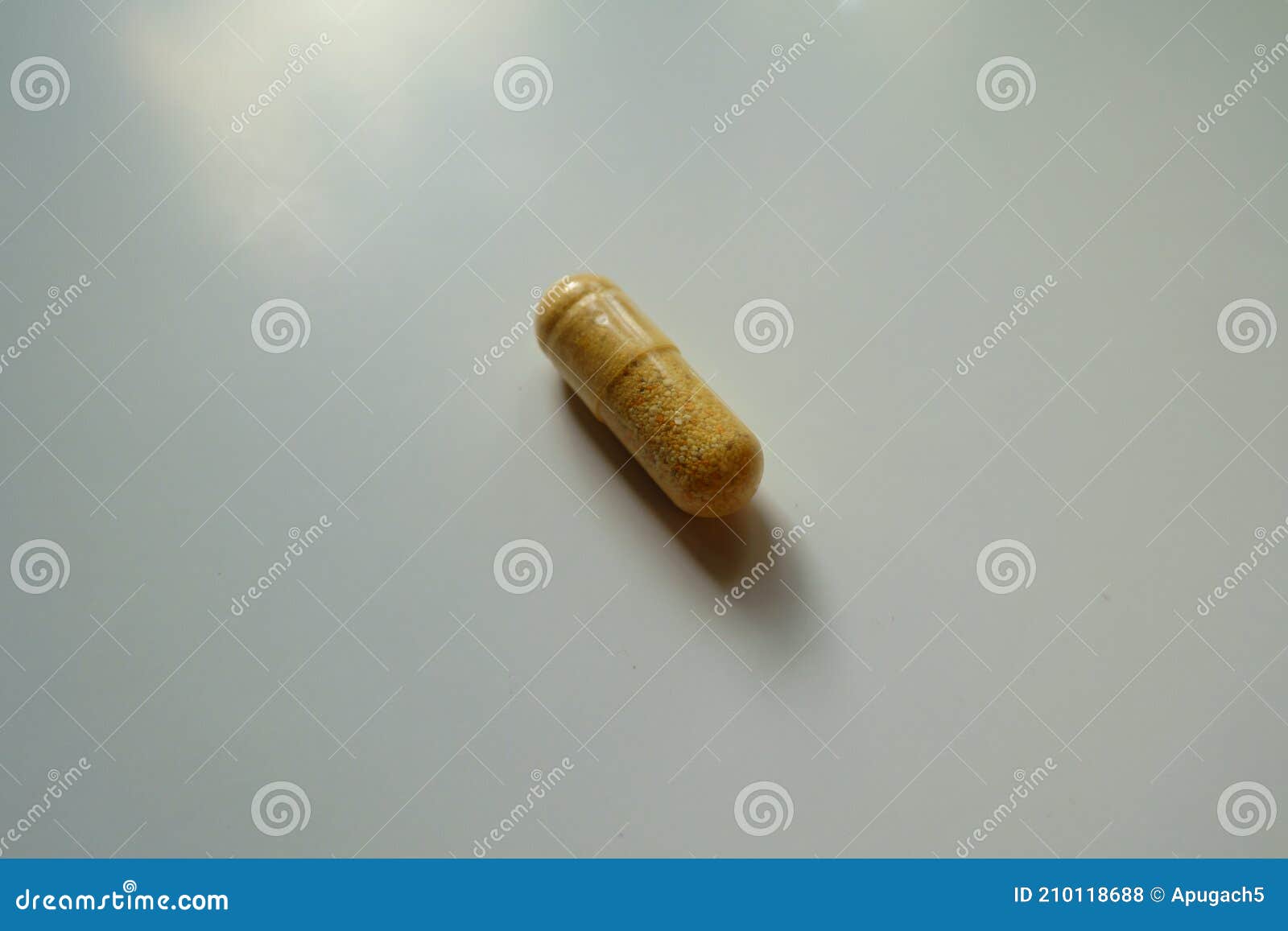 One Orange Capsule of Multivitamins Dietary Supplement Stock Photo ...