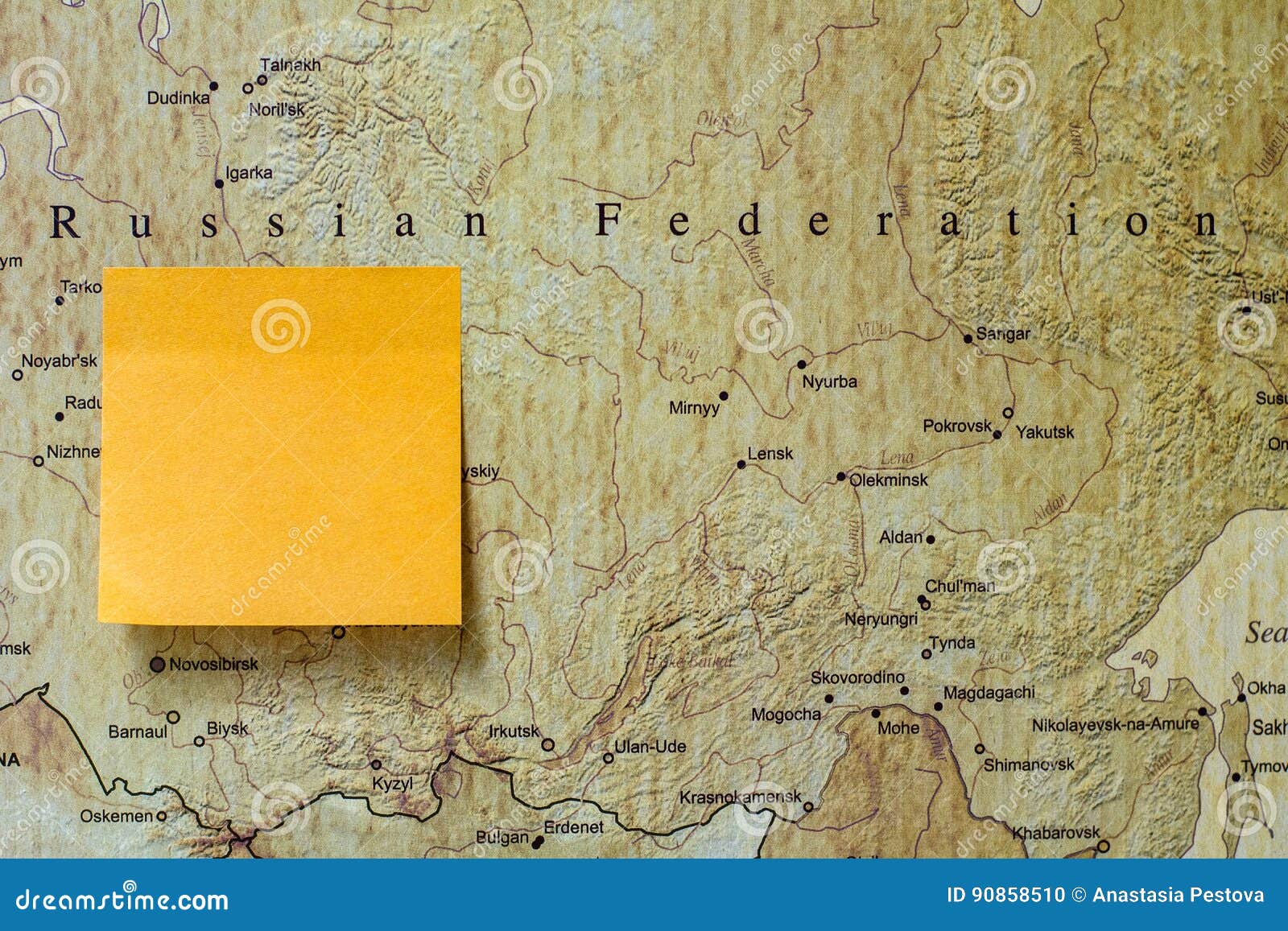 One Orange Piece of Paper on World Map Stock Photo - Image of ...