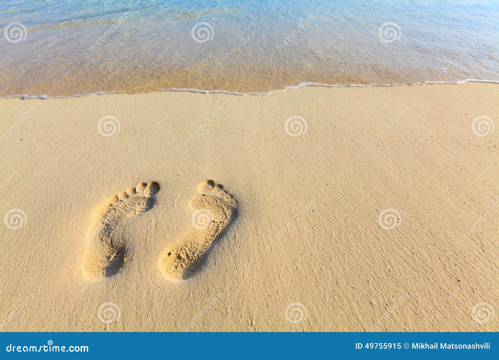 One Pair Footstep on the Beach Stock Image - Image of foam, mark: 49755915