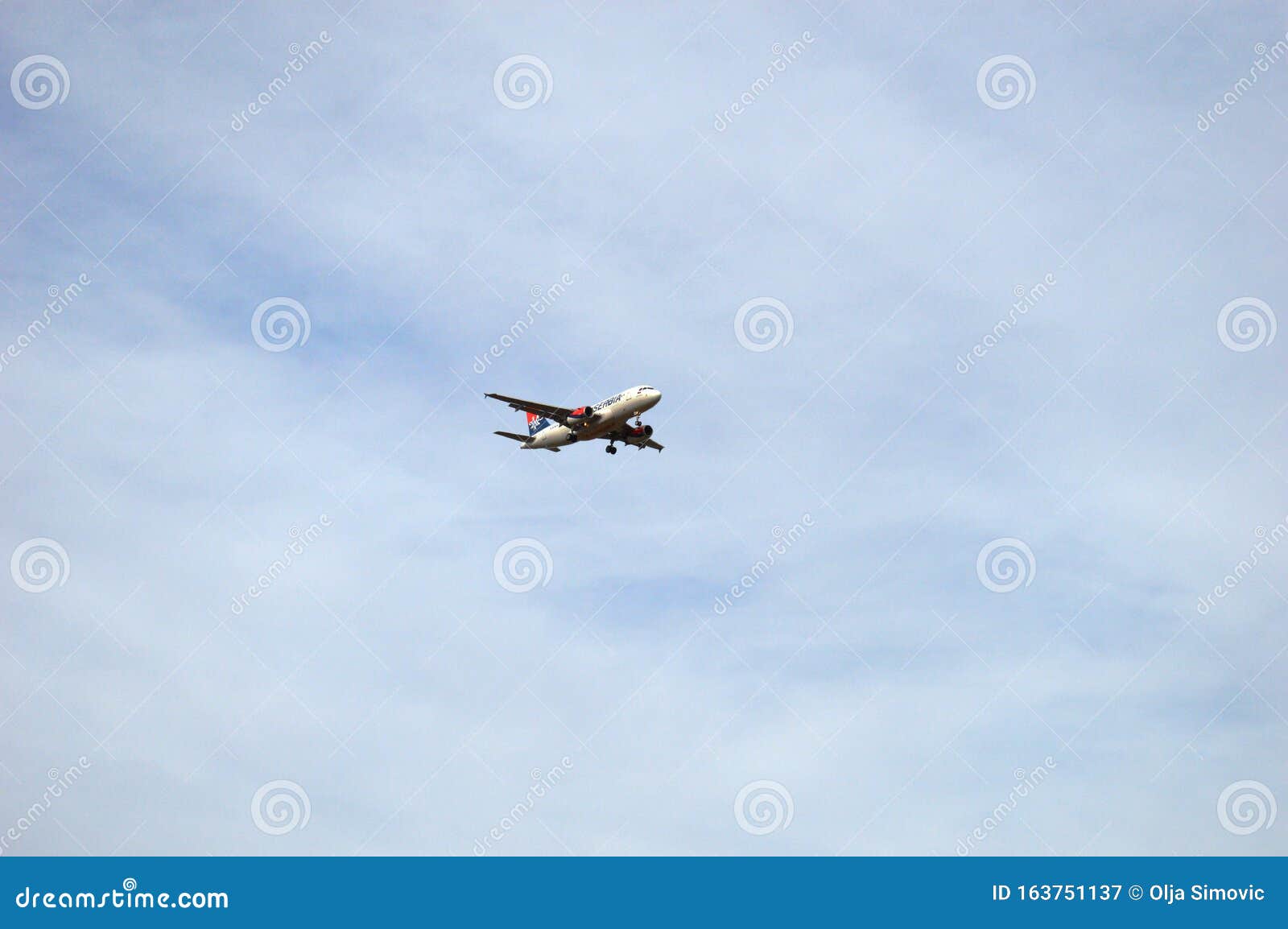 Passenger plane in flight editorial photography. Image of travel ...