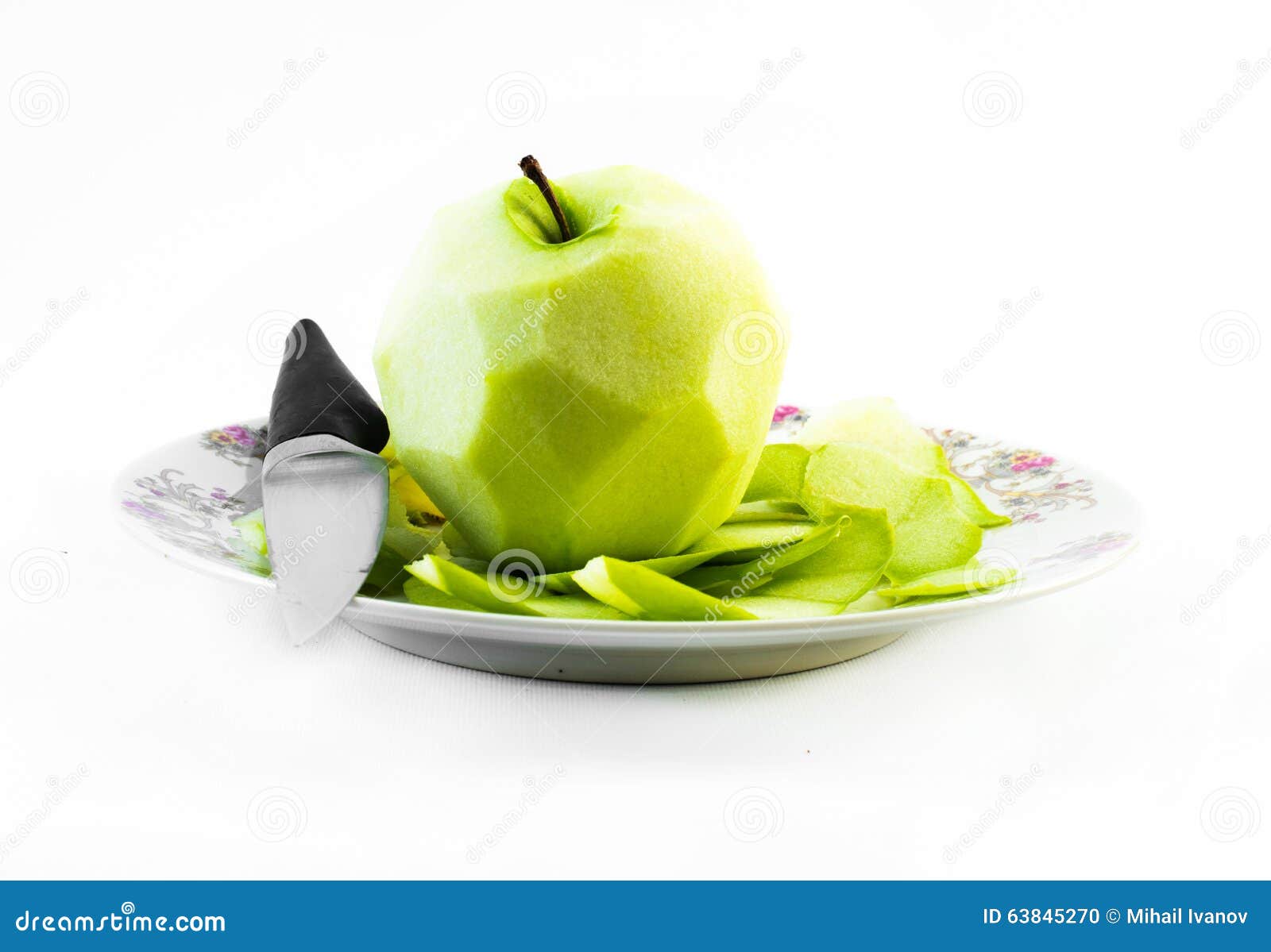 One Peeled Green Apple with Knife on a White Plate and White Background ...