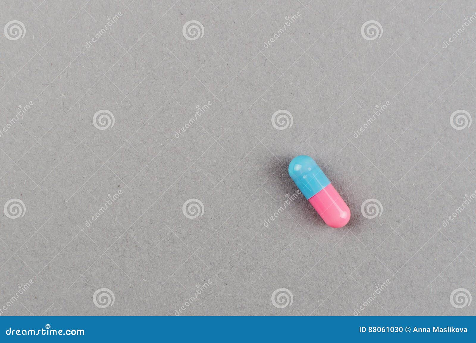 One Pill Colored in Pink and Blue with Copy Space Stock Photo - Image ...