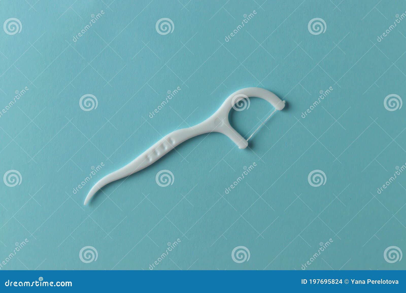 Plastic Toothpick with Dental Floss on Blue Background Stock Photo ...