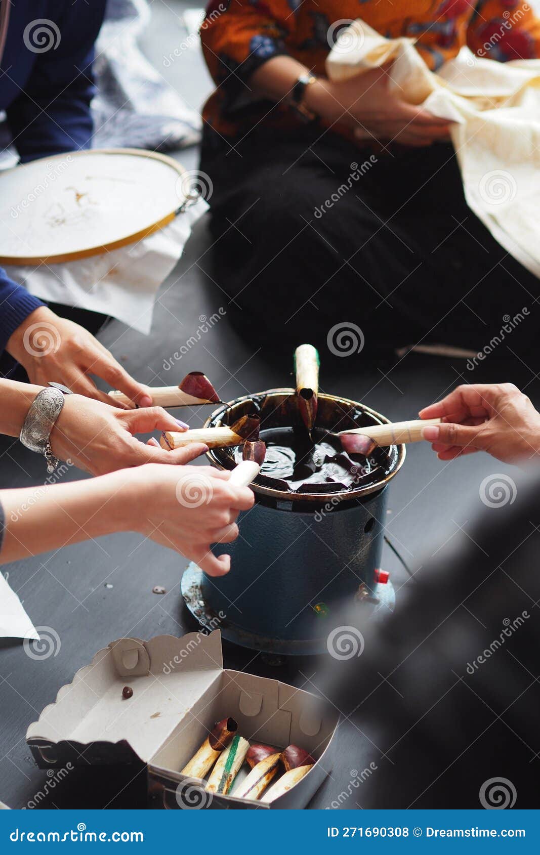 Making a batik together stock photo. Image of performance - 271690308