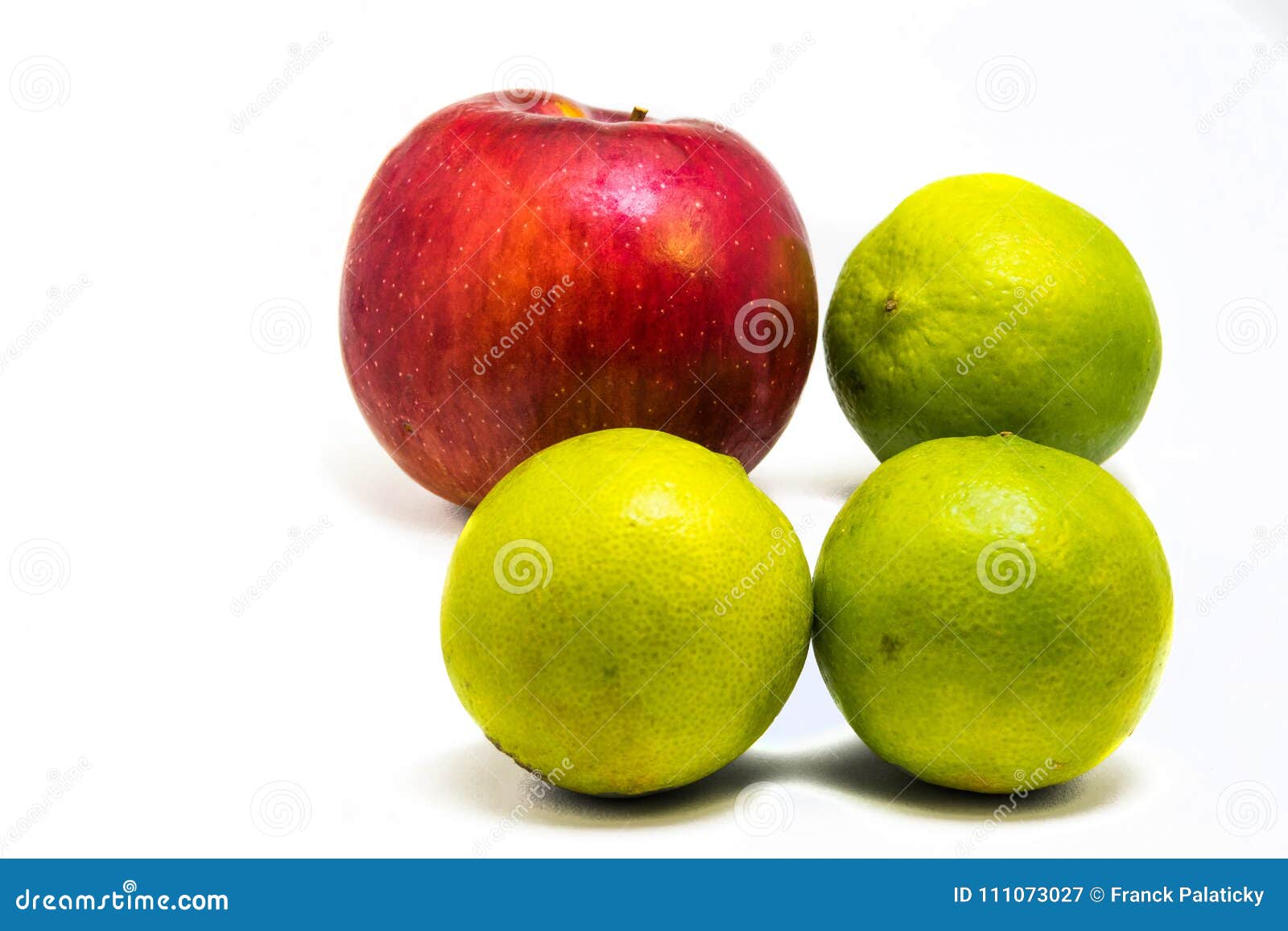 One Red Apple and Three Green Lime Stock Image - Image of ripe, green ...