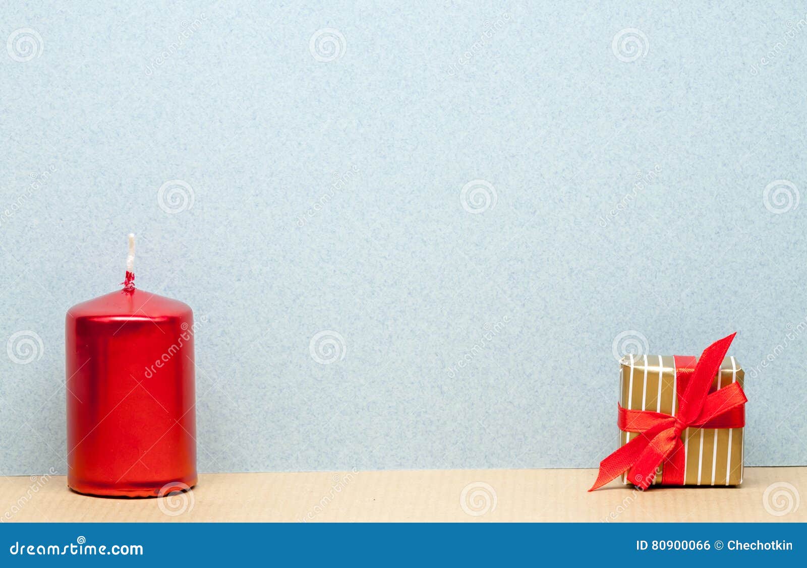One Red Candle and Small Gift Stock Photo - Image of happy, cozy: 80900066
