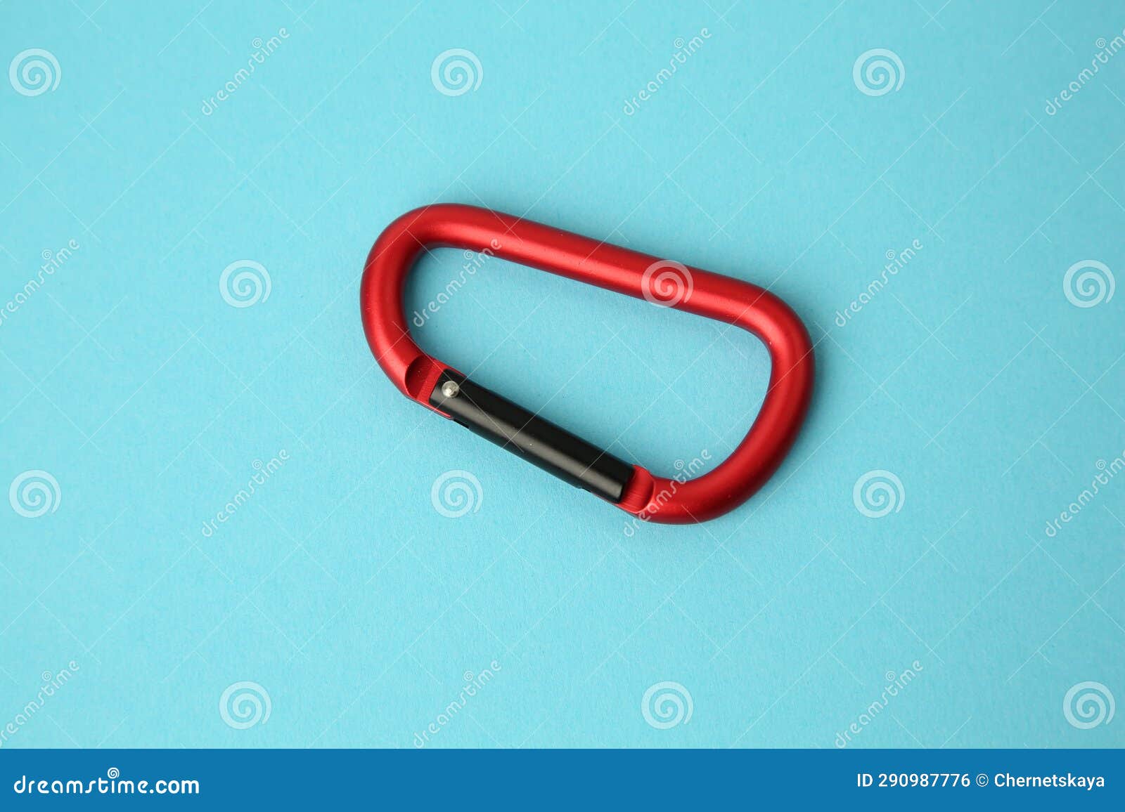 One Red Carabiner on Light Blue Background, Top View Stock Photo ...