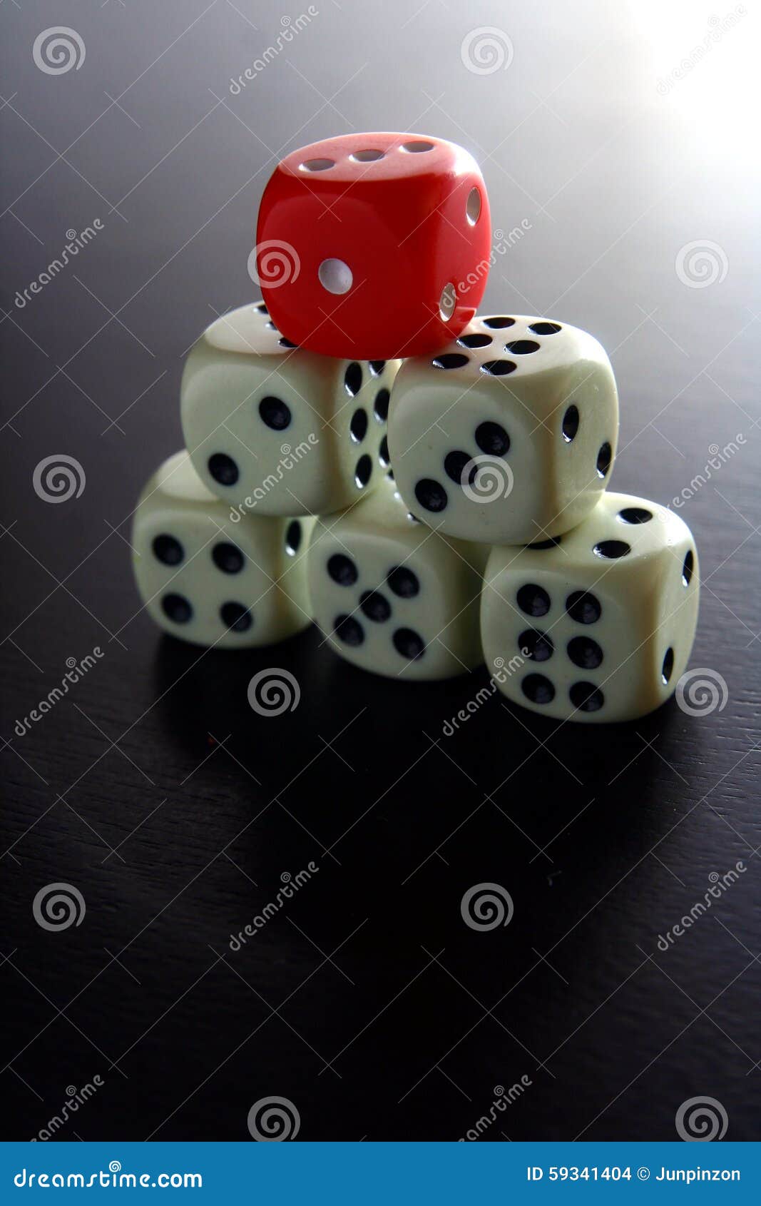One Red Game Dice on Top of Stacked Five White Game Dice Stock Photo ...