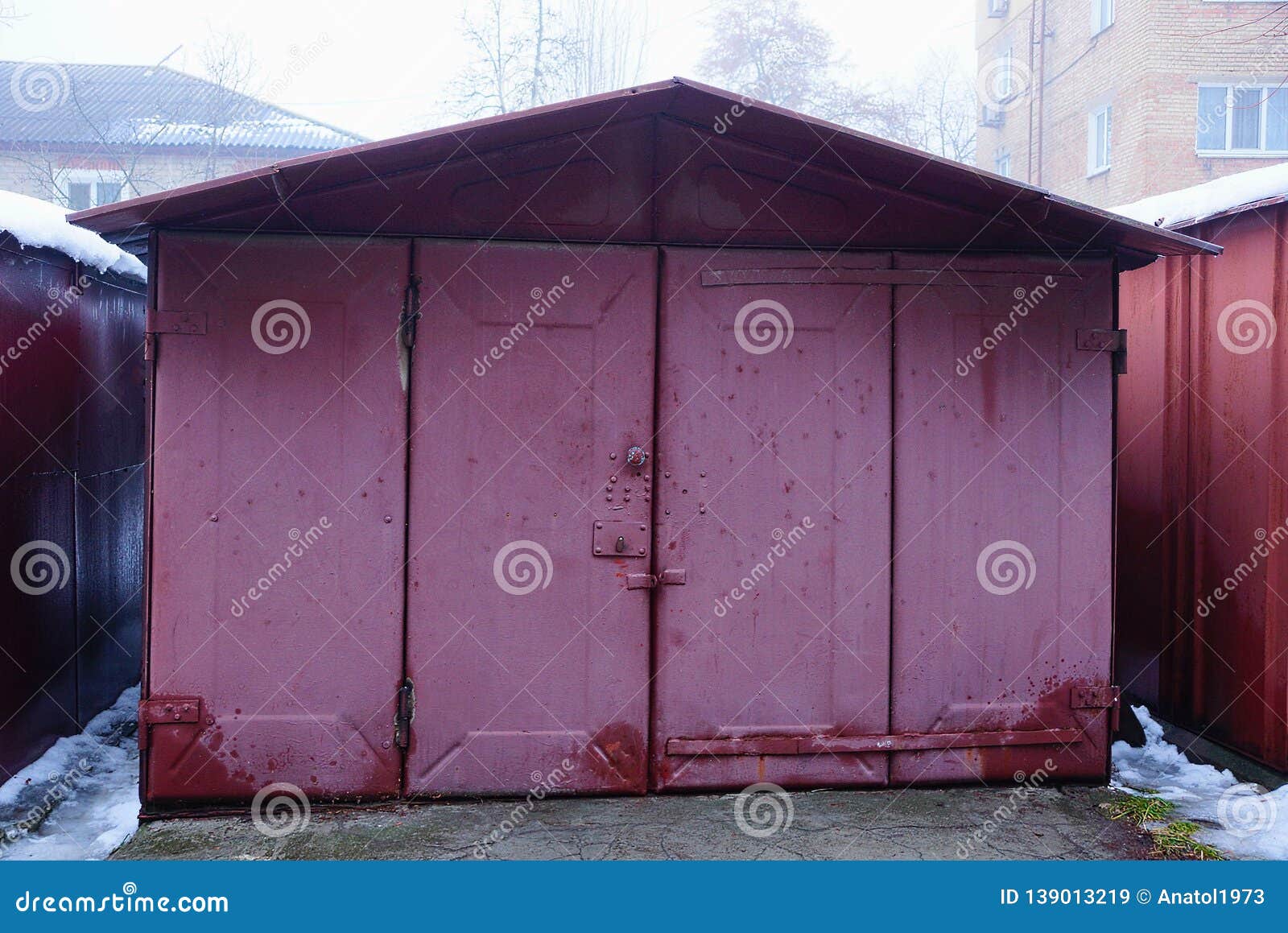 Red Iron Closed Garage Outside in the Snow Stock Image - Image of ...
