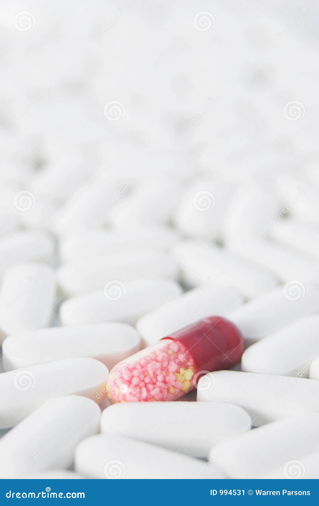 One Red Pill in Many White Pills Stock Image - Image of medication ...