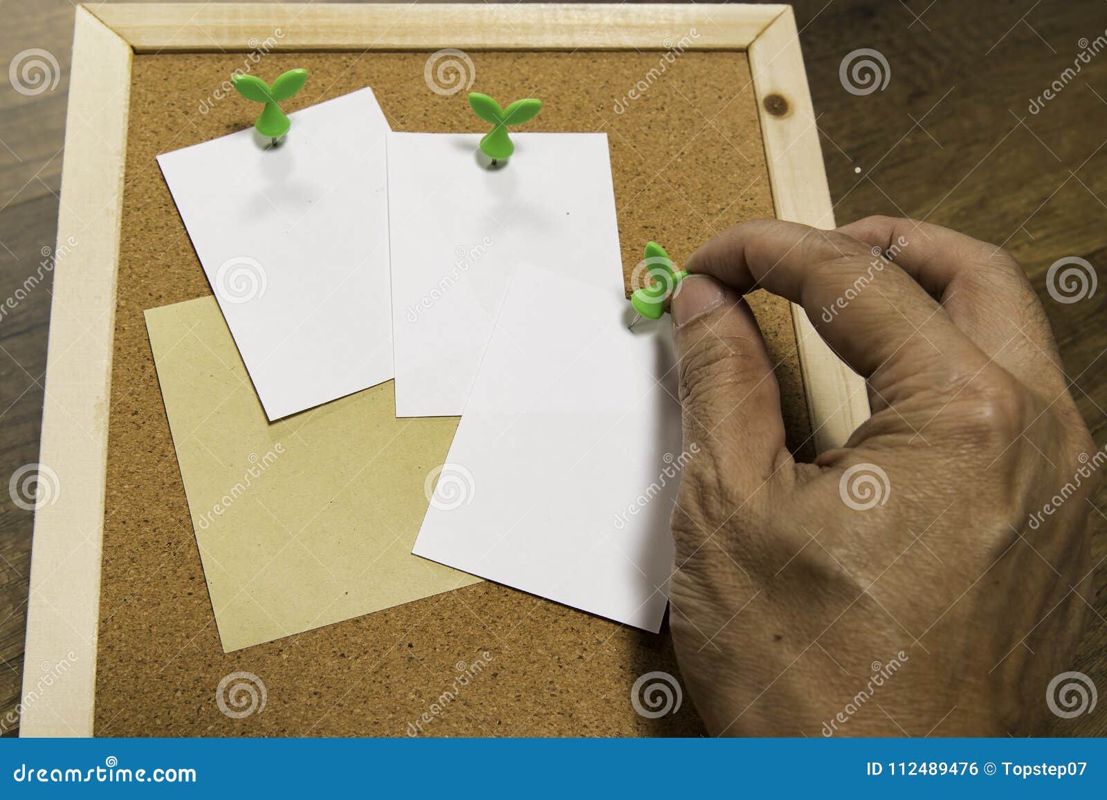 One Right Human Hand Pin on Blank Small White Paper on Cork Board Stock ...