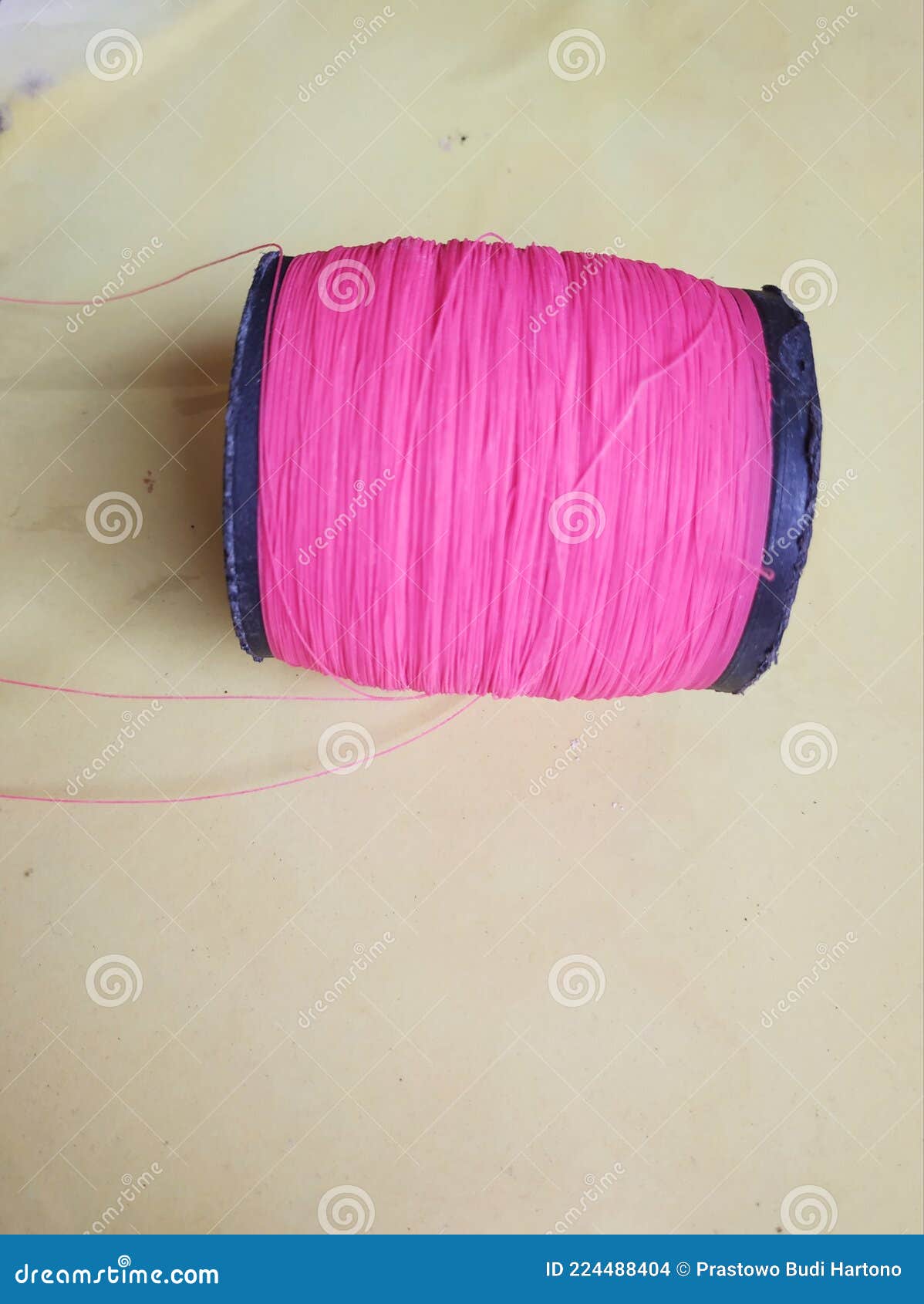 One Roll of Yarn for Kite Flying Stock Photo - Image of pink, brown ...