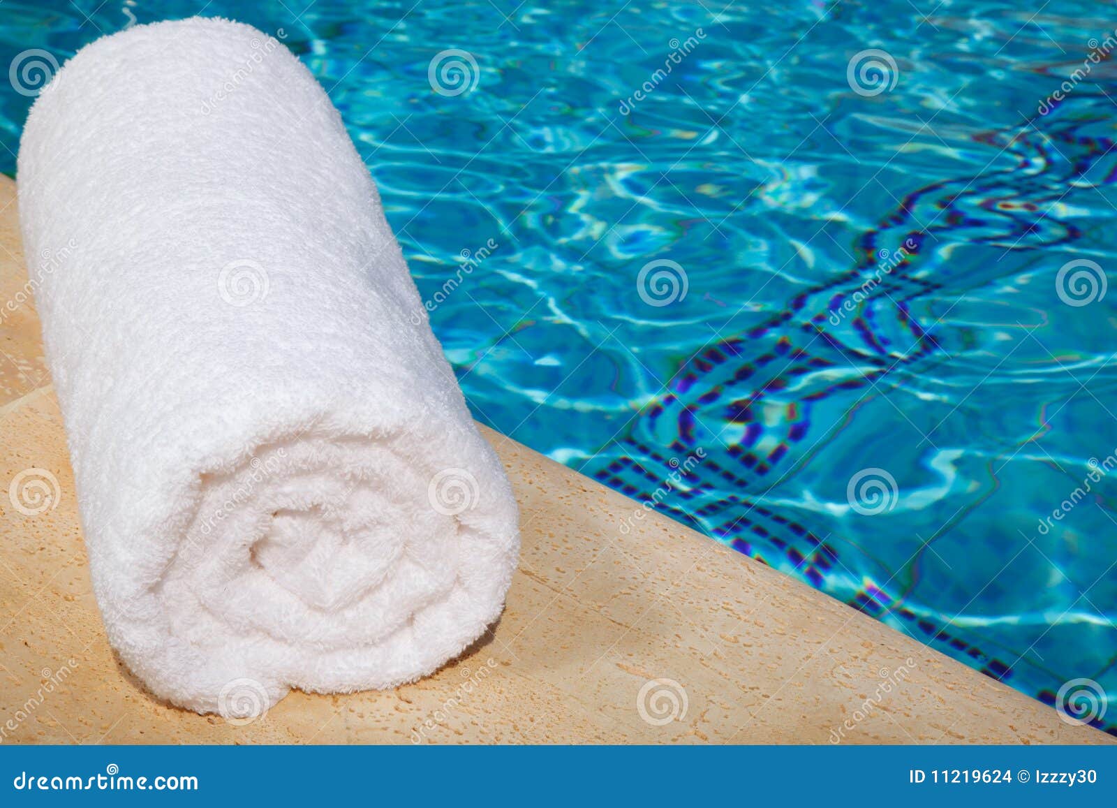 One Rolled-up White Towel by Blue Pool Stock Photo - Image of hotel ...