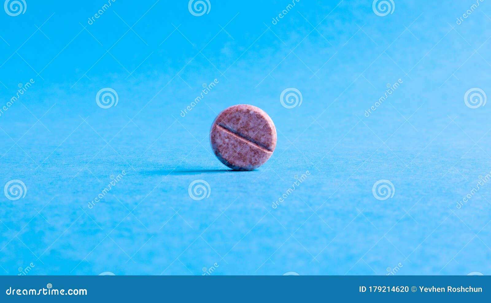 One Round Small Pill on a Blue Background in the Center with Empty ...