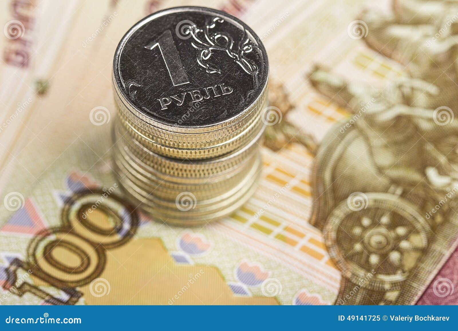 One Ruble Against the Background of Hundred-ruble Bills Stock Image ...