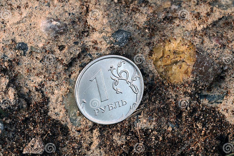 One ruble on the ground. stock photo. Image of background - 134714798