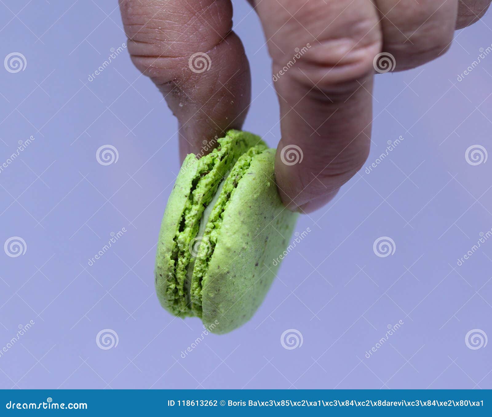 One`s Hand Holding Green Macaron. Stock Photo - Image of macaroon ...