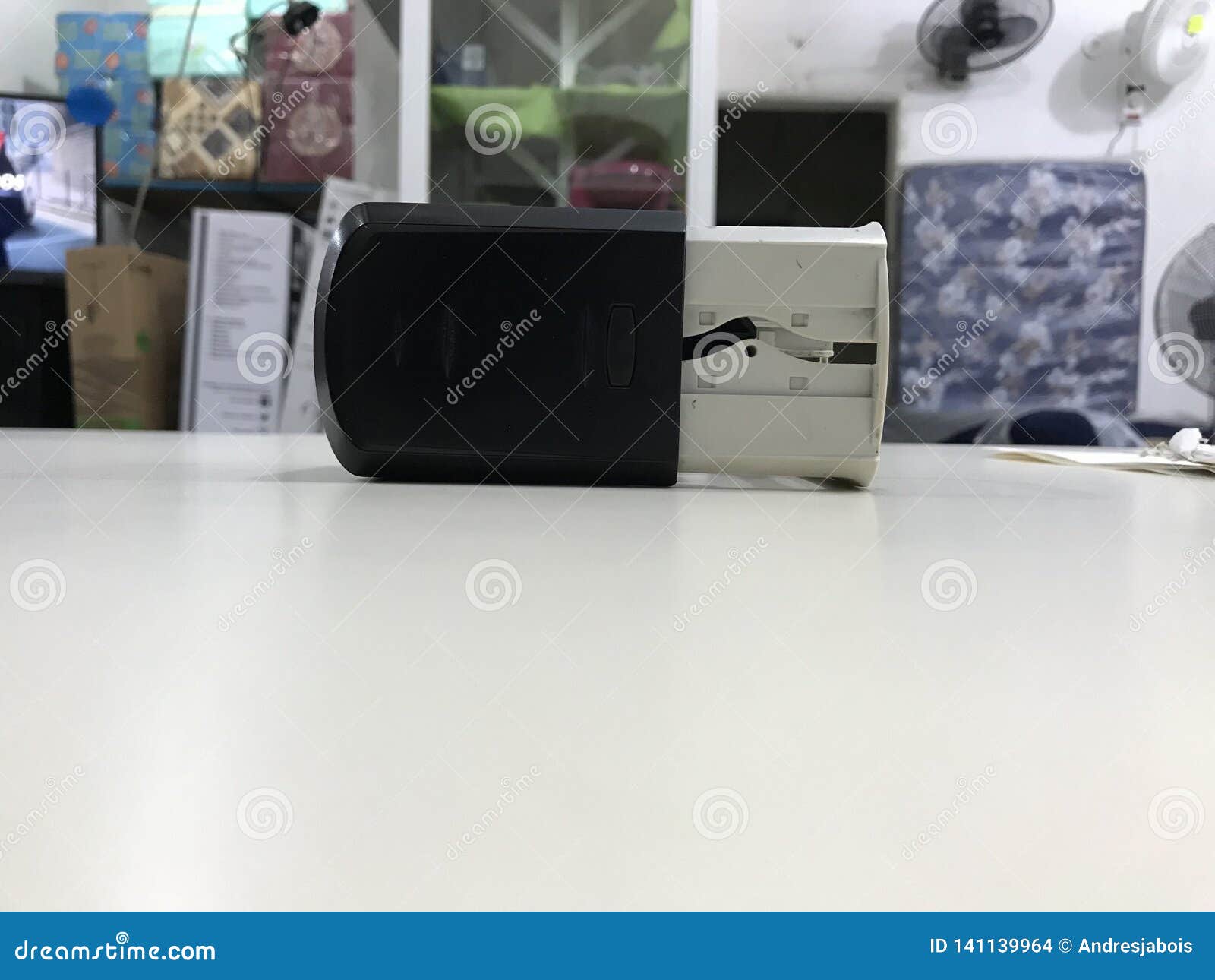 One Self Inked Printer Dater on Top of a Beige Desktop in the Workplace ...