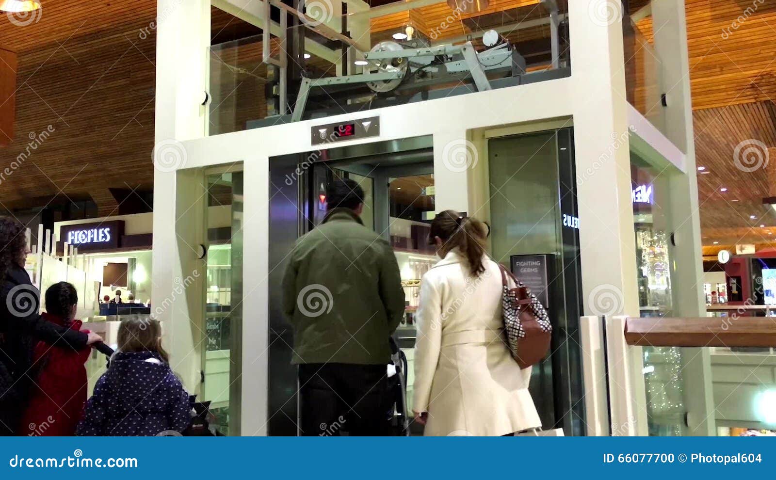 One Side of People Taking Elevator Stock Footage - Video of city ...