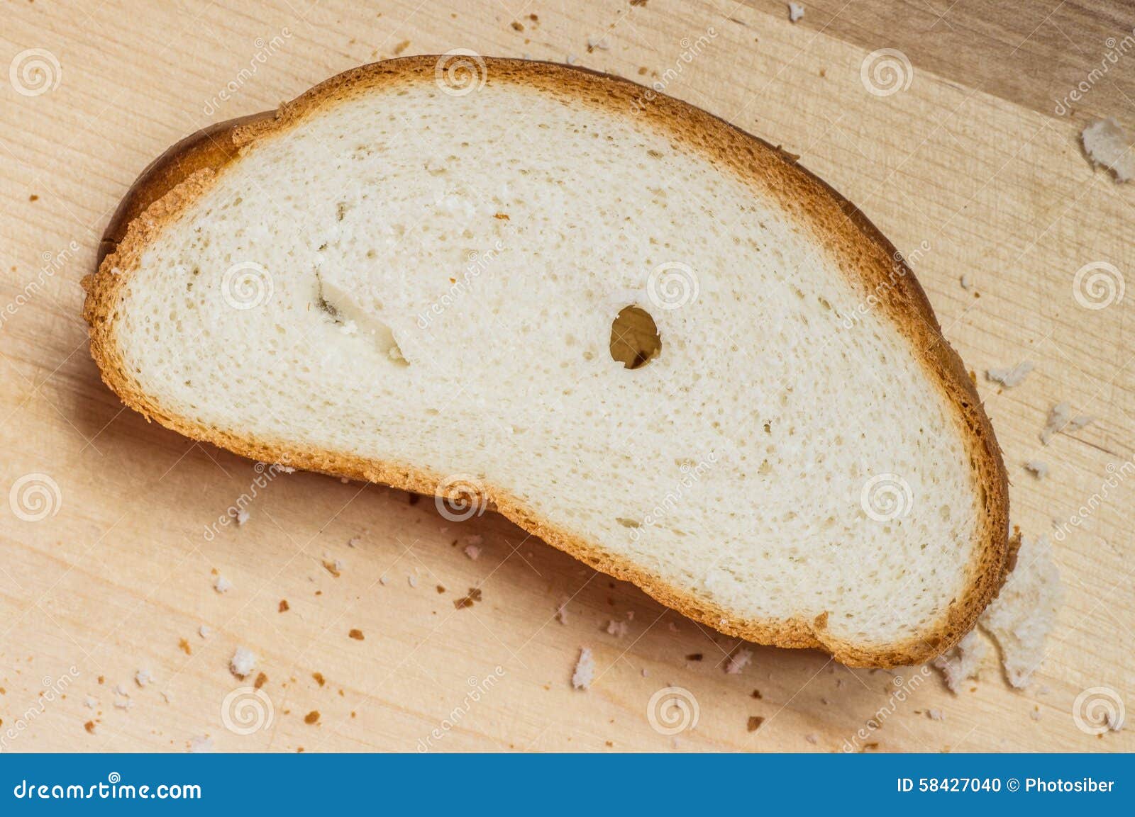 One Slice of Bread on the Table Stock Photo - Image of brown, cereal ...