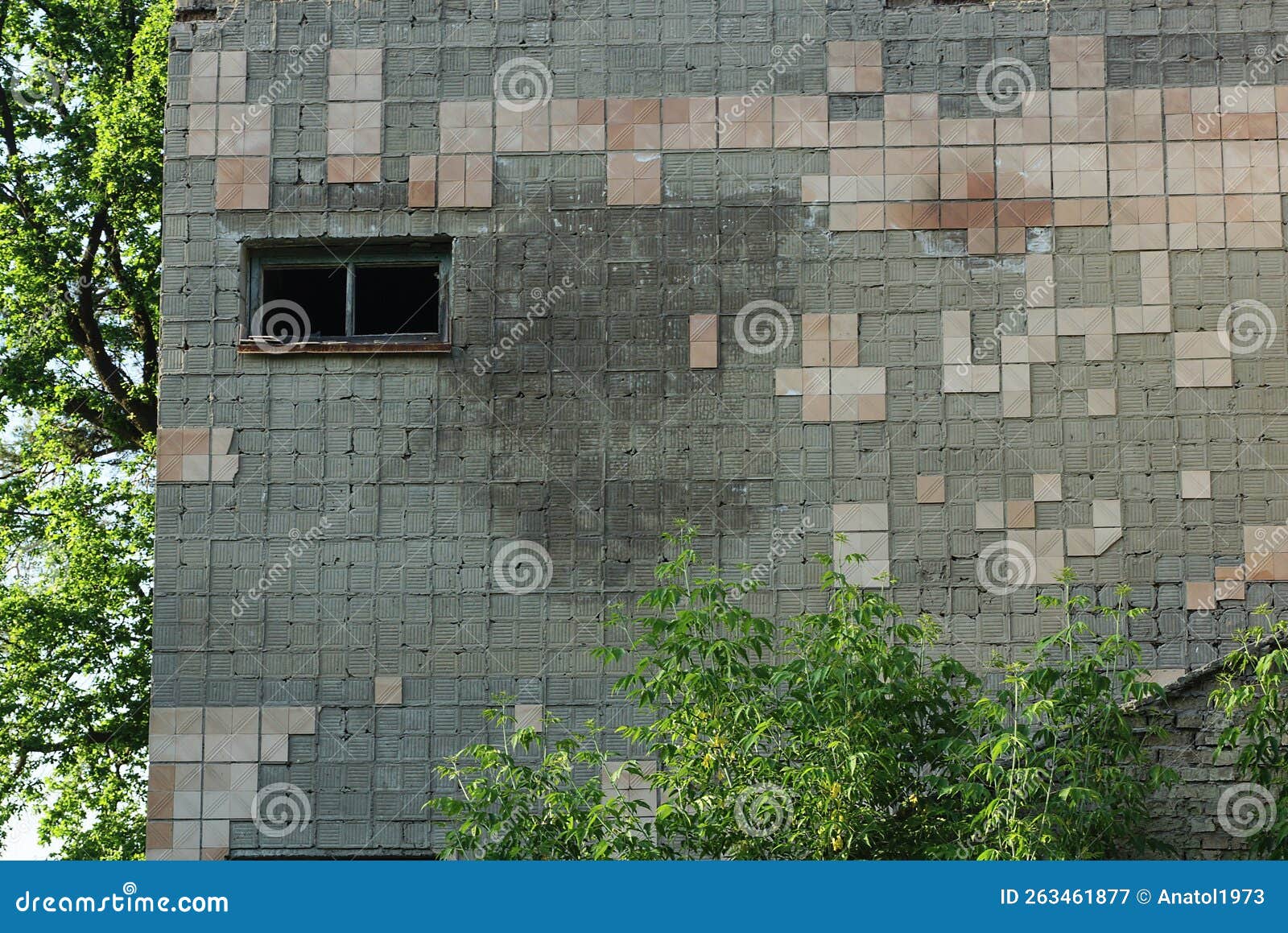 One Small Broken Empty Window without Glass on a Gray Wall with Brown ...