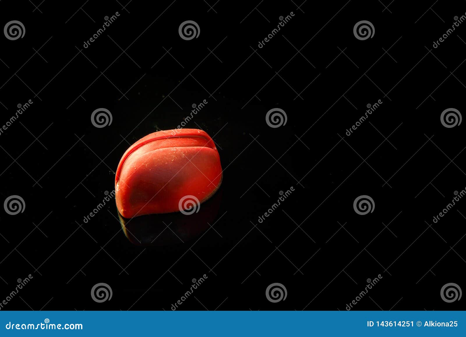 One Small Red Oval-shaped Chocolate Candy with Decoration Stock Image ...