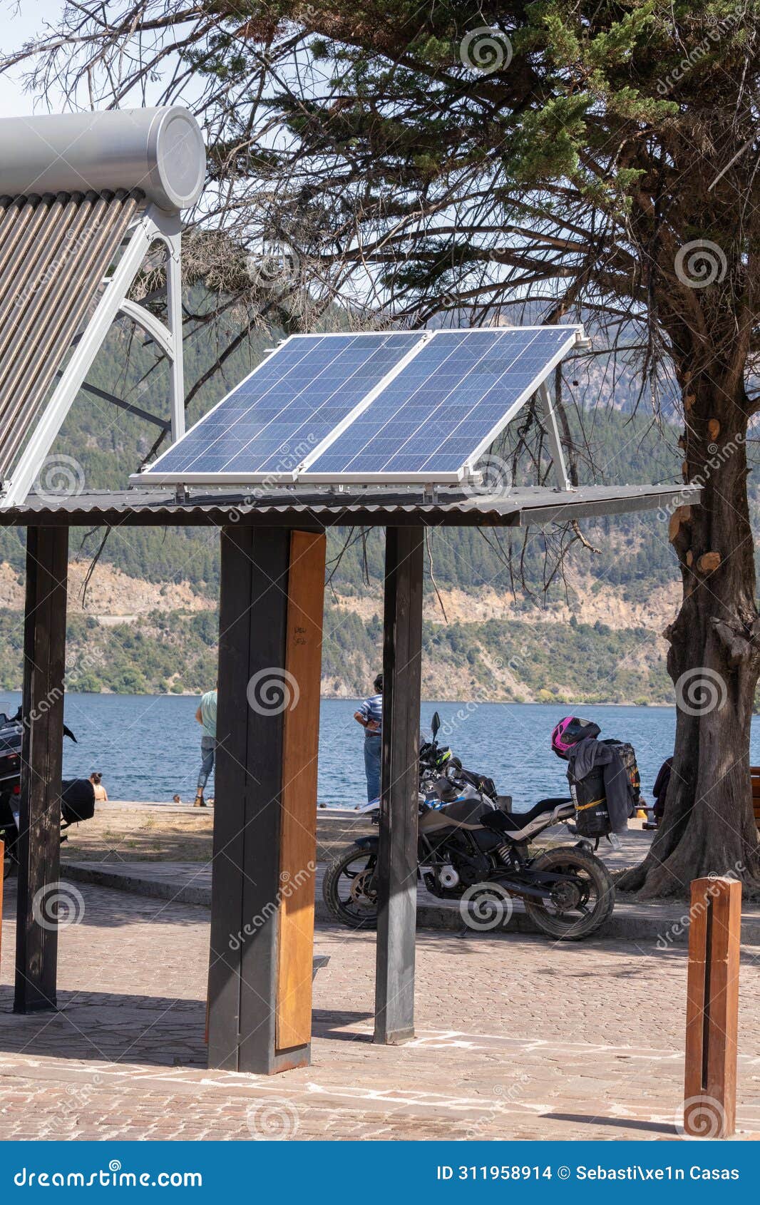 One Solar Panel in a Pole in the Middle of a Park with a Lake and Trees ...