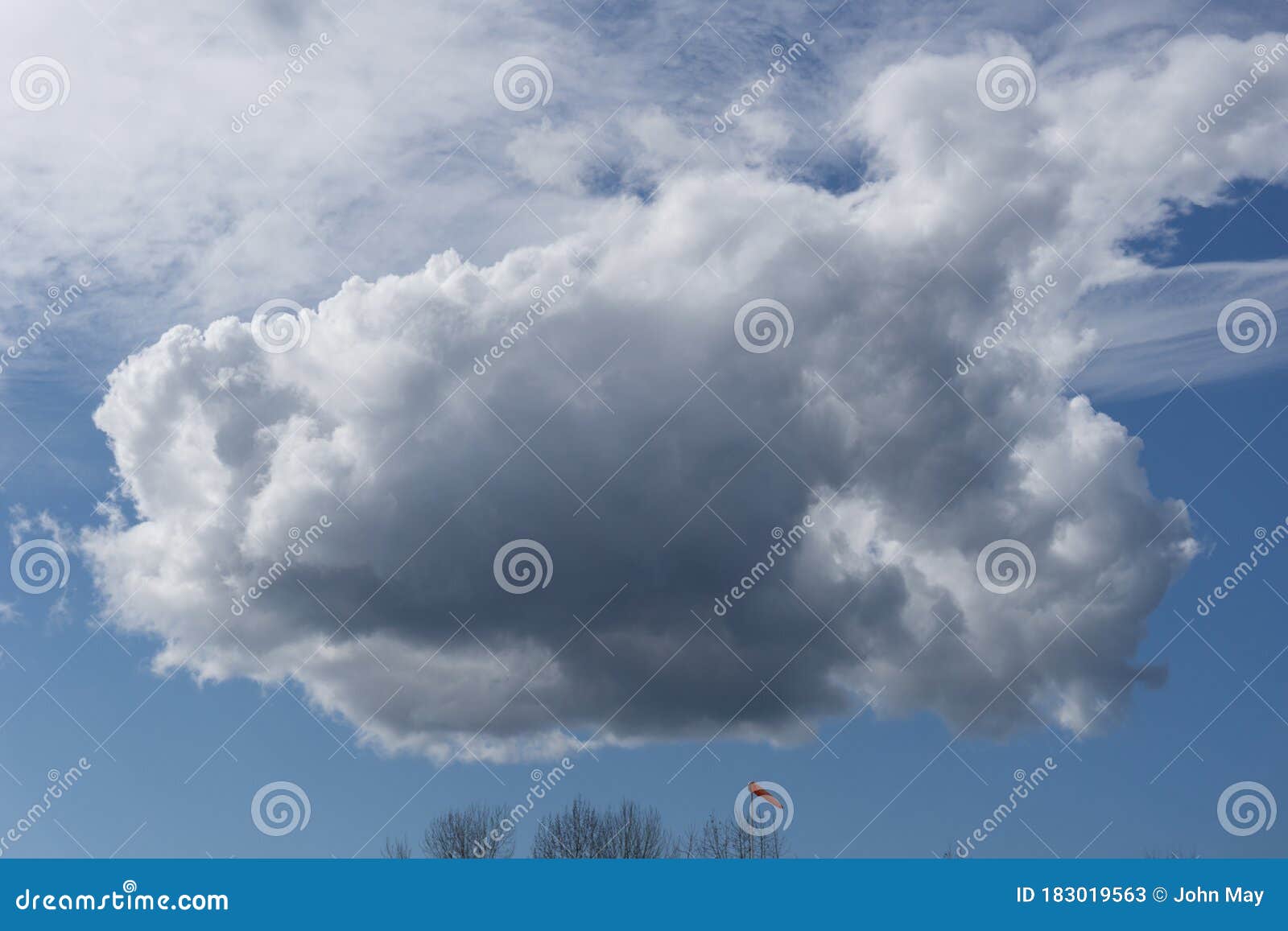 A Solitary Low Level Cloud on a Bright Spring Day. Stock Image - Image ...