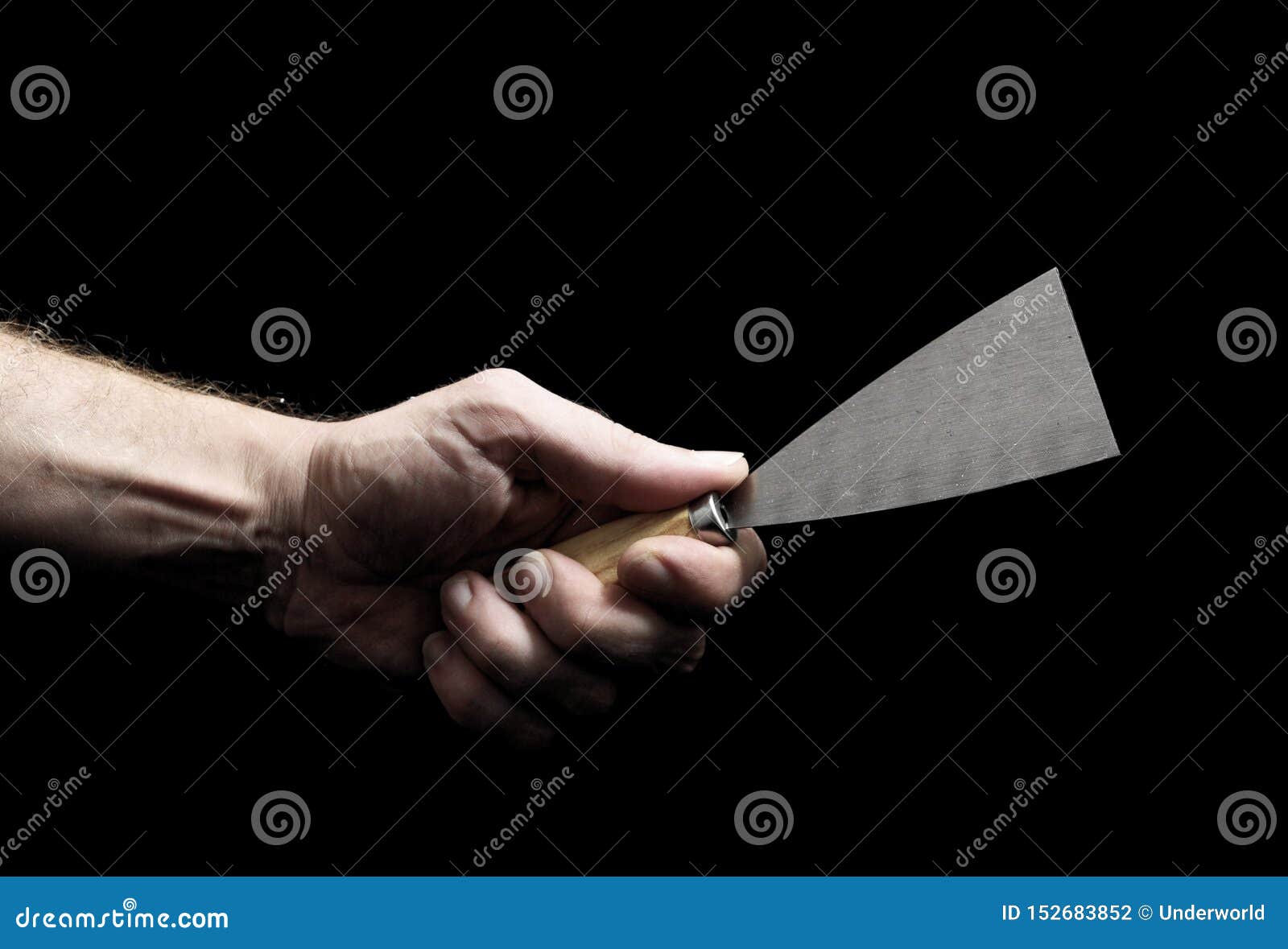 One Spatula and a Hand stock photo. Image of construction - 152683852