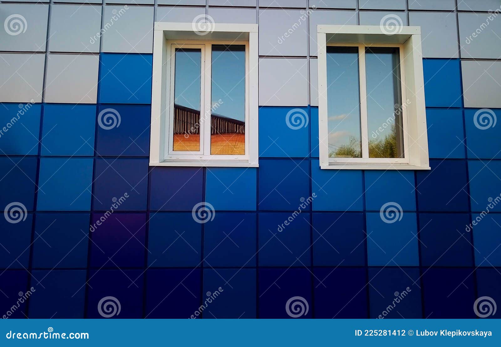 The One-story House is Covered with Blue Panels Stock Photo - Image of ...