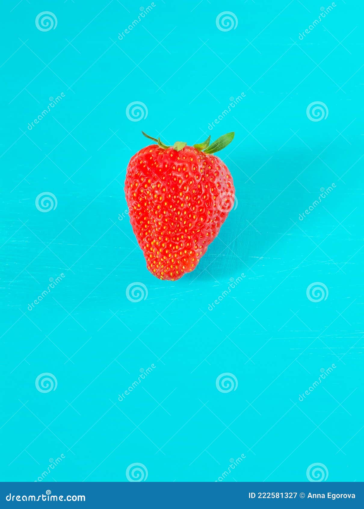 One Strawberry Berry on a Turquoise Background Stock Image - Image of ...