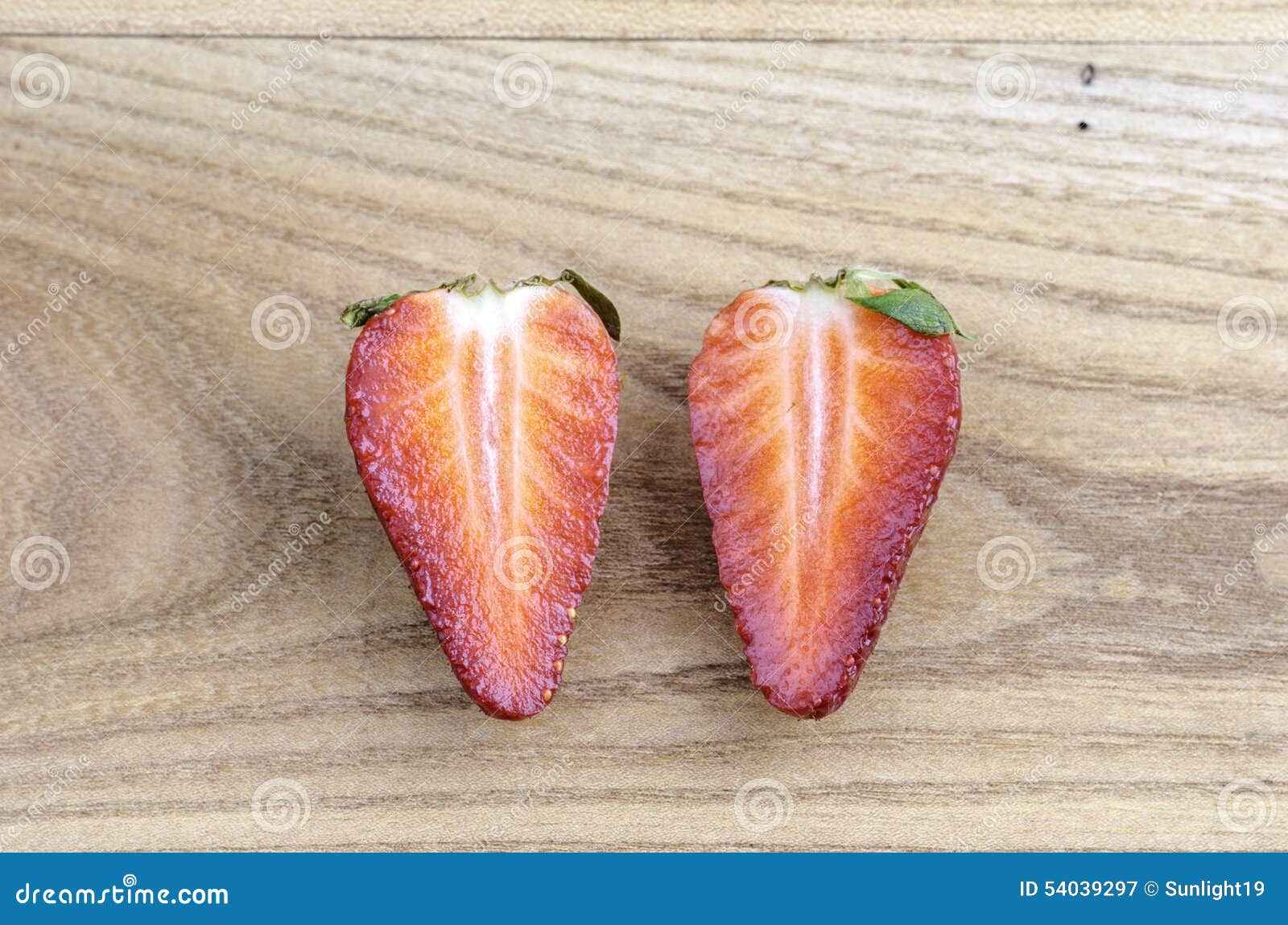One Strawberry Cut in Half Over Wood. Stock Image - Image of vibrant ...
