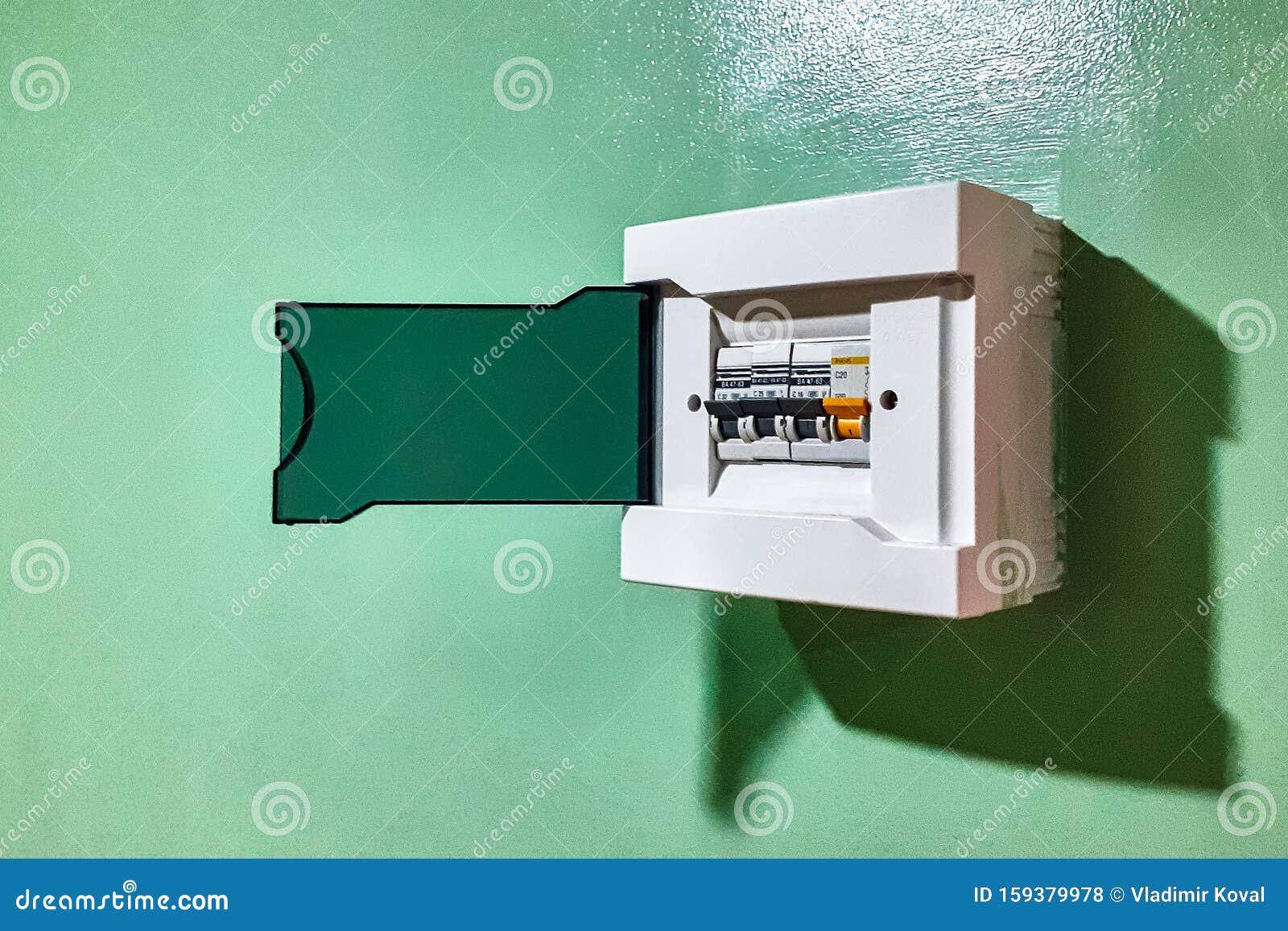 One Switchboard with Automatic Close-up on the Green Wall Stock Photo ...