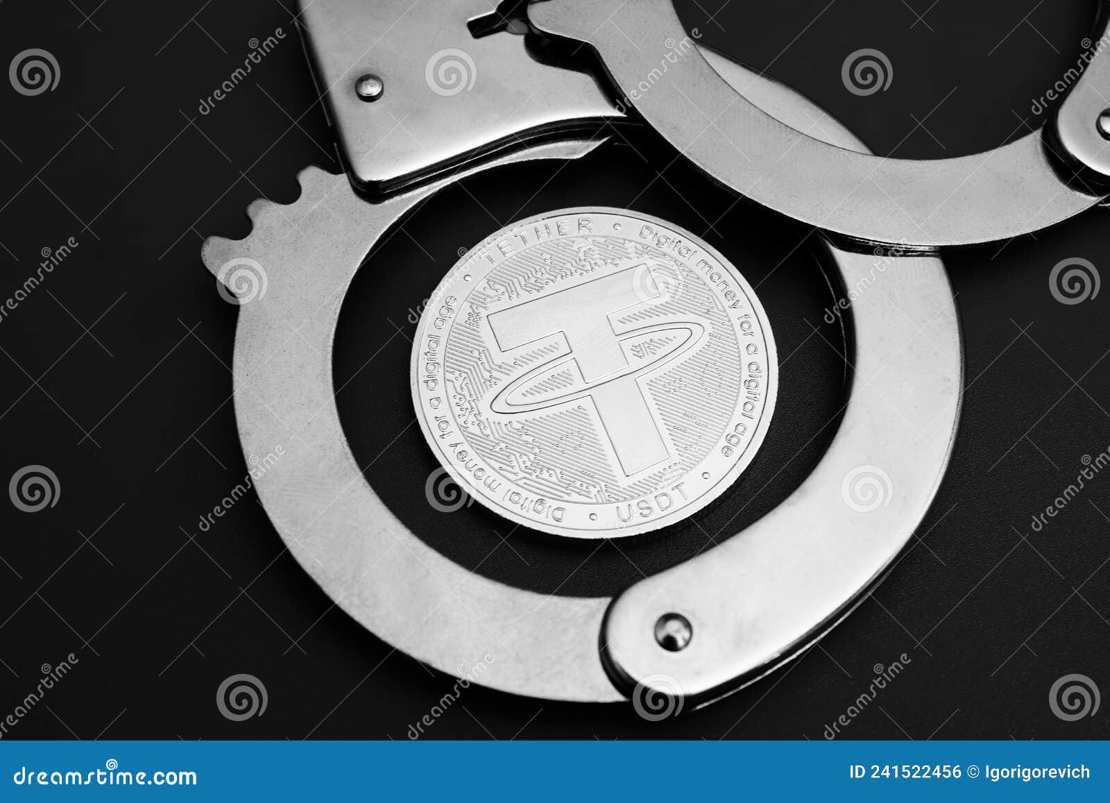 Tether coin and handcuffs stock photo. Image of business - 241522456