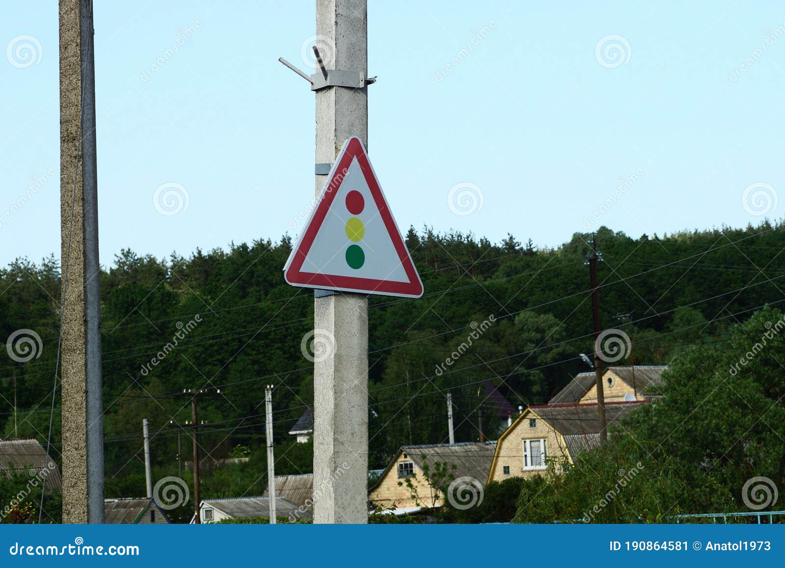 One Triangular Road Sign Traffic Light on a Gray Concrete Pillar Stock ...