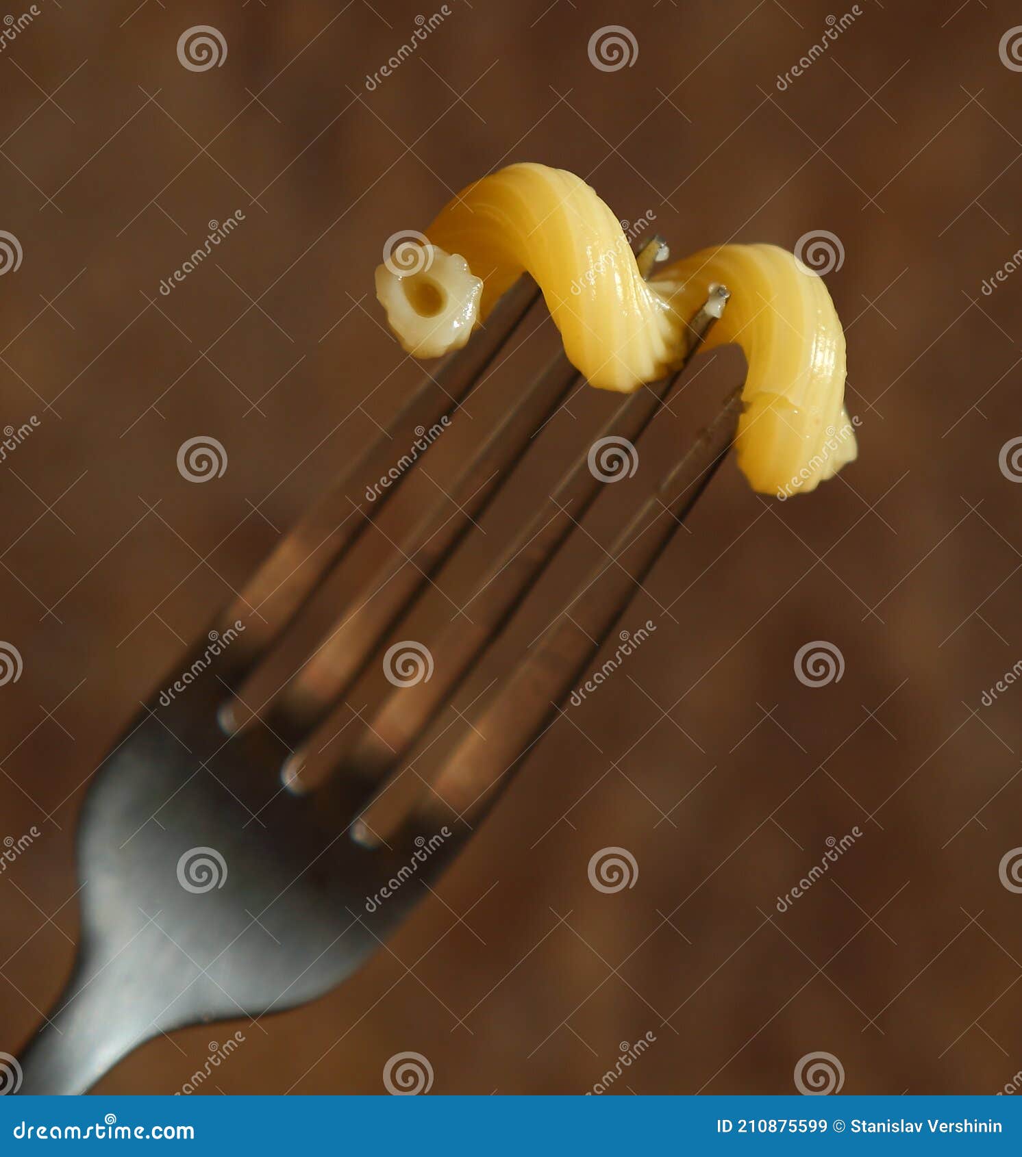 One Twisted Strand of Spaghetti on a Metal Fork Stock Image - Image of ...