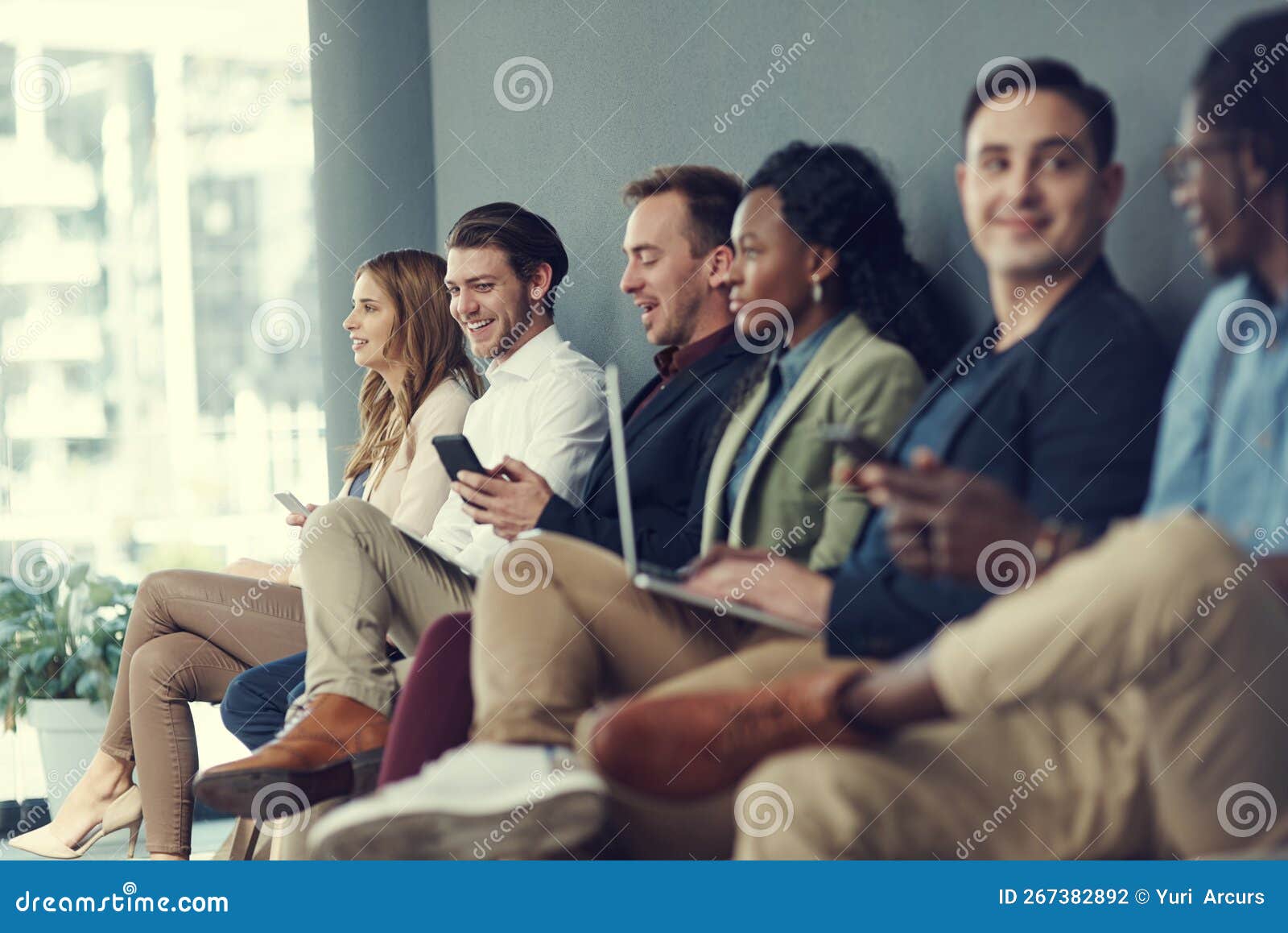 One of Us Will Get the Job. a Group of Businesspeople Using Different ...