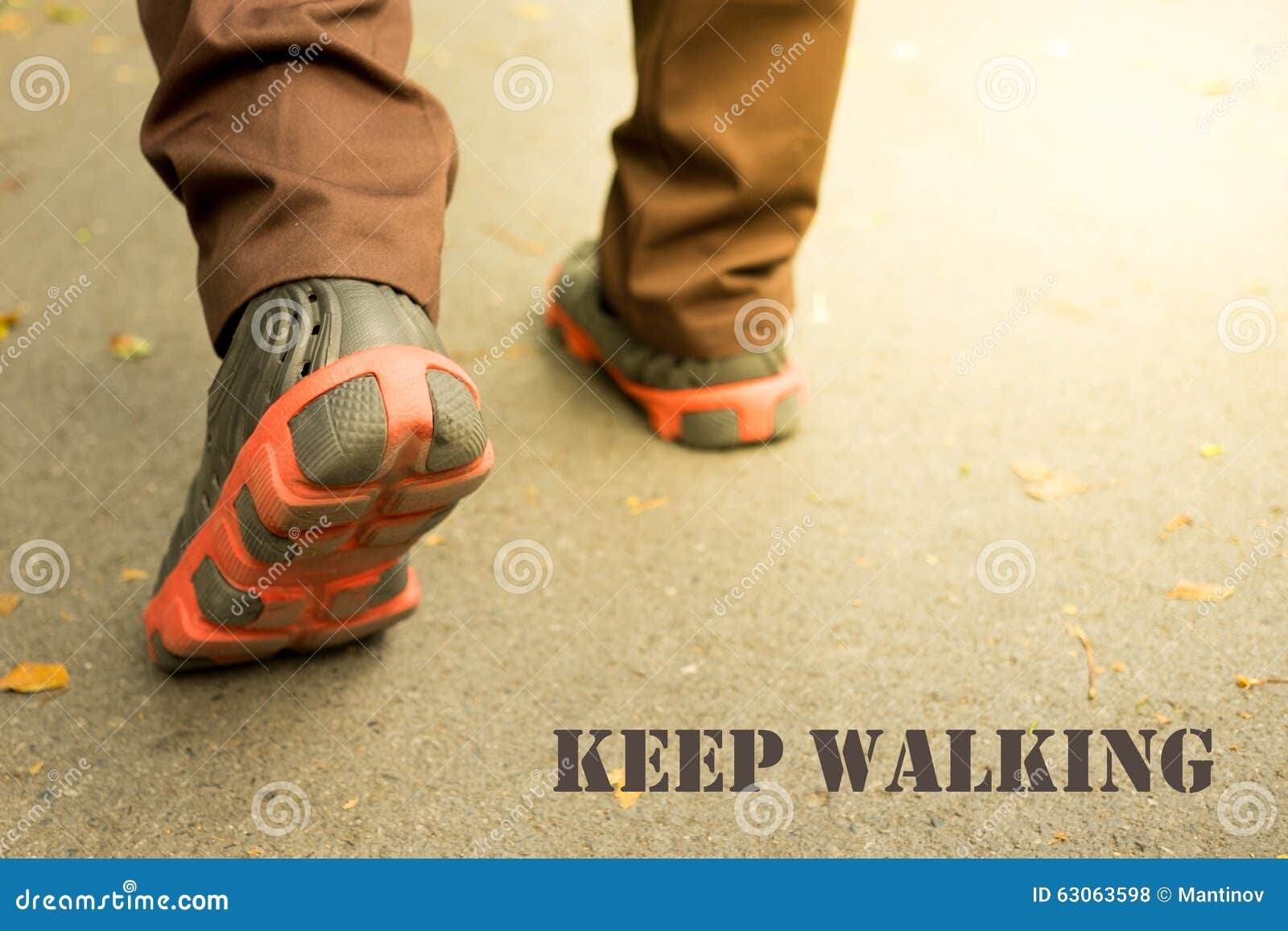 One is Walking in Evening Light and Quote Keep Walking Stock Photo ...